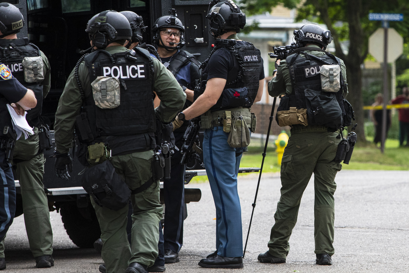 Police surround home on Kalamazoo's Southeast side - mlive.com