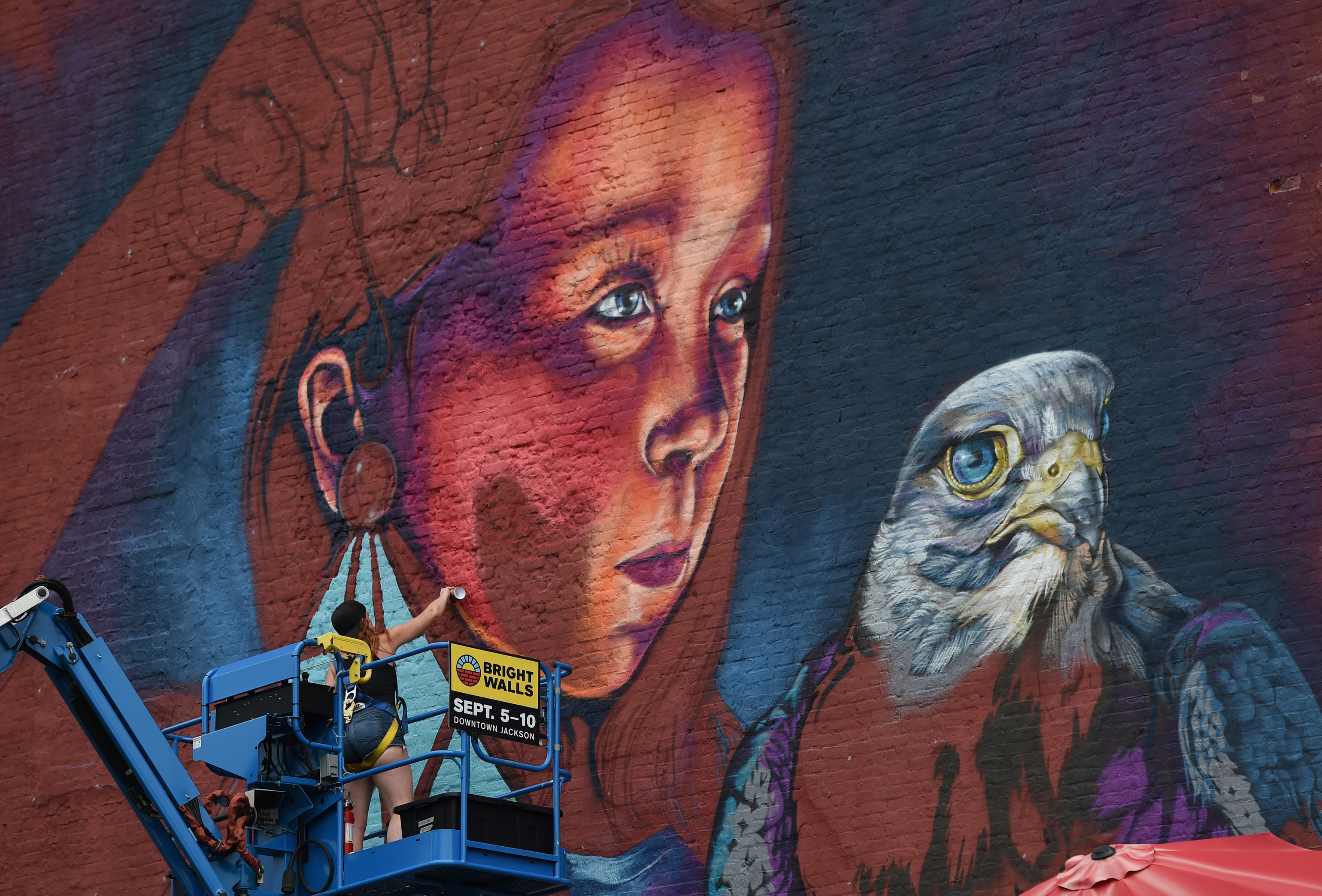 Bright Walls preview mural underway in downtown Jackson - mlive.com