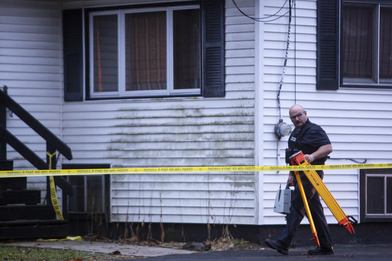 Three officers shot and homeowner killed in home invasion - mlive.com