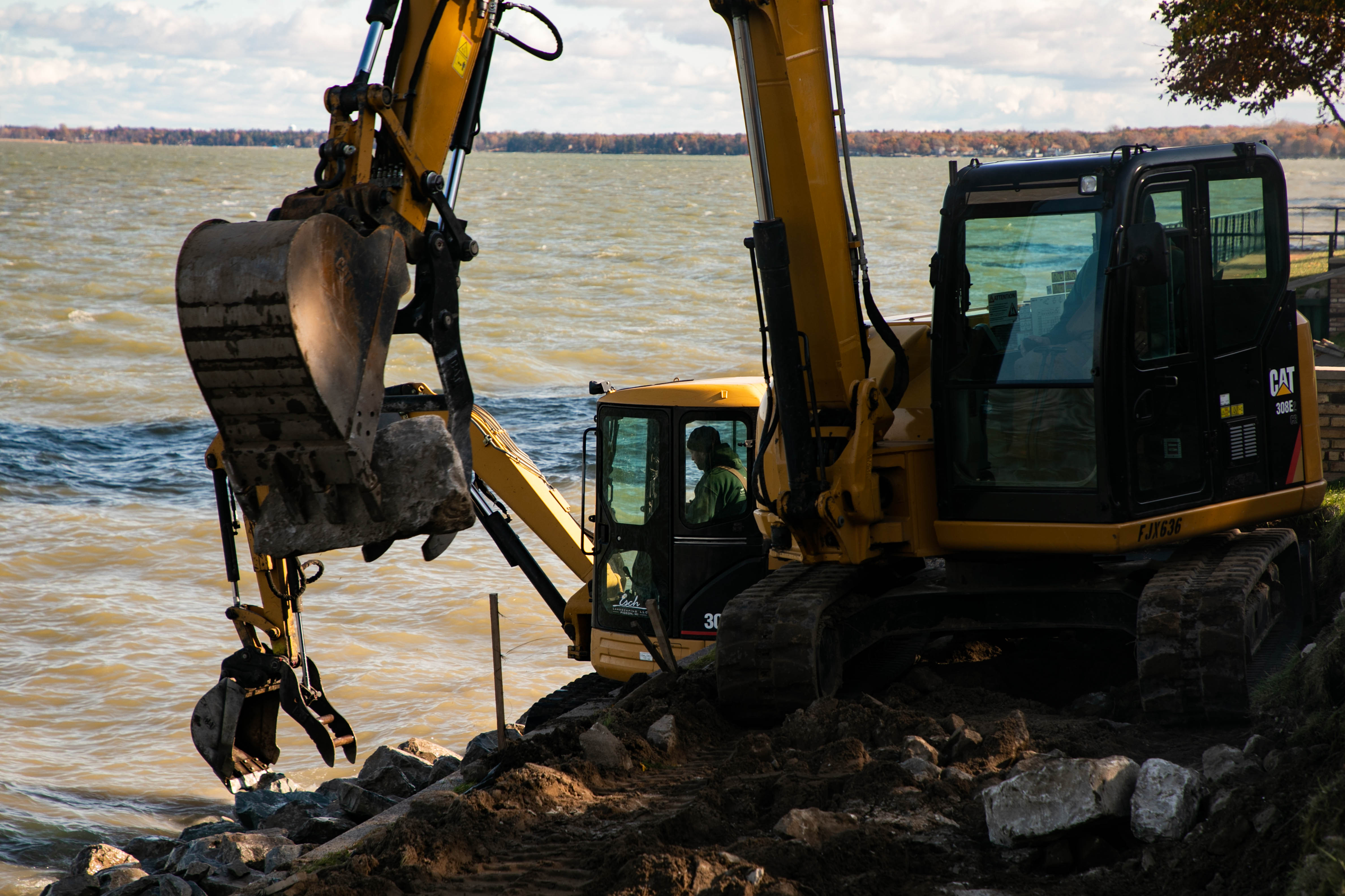 High water levels causing erosion in Sand Point homeowners yards ...