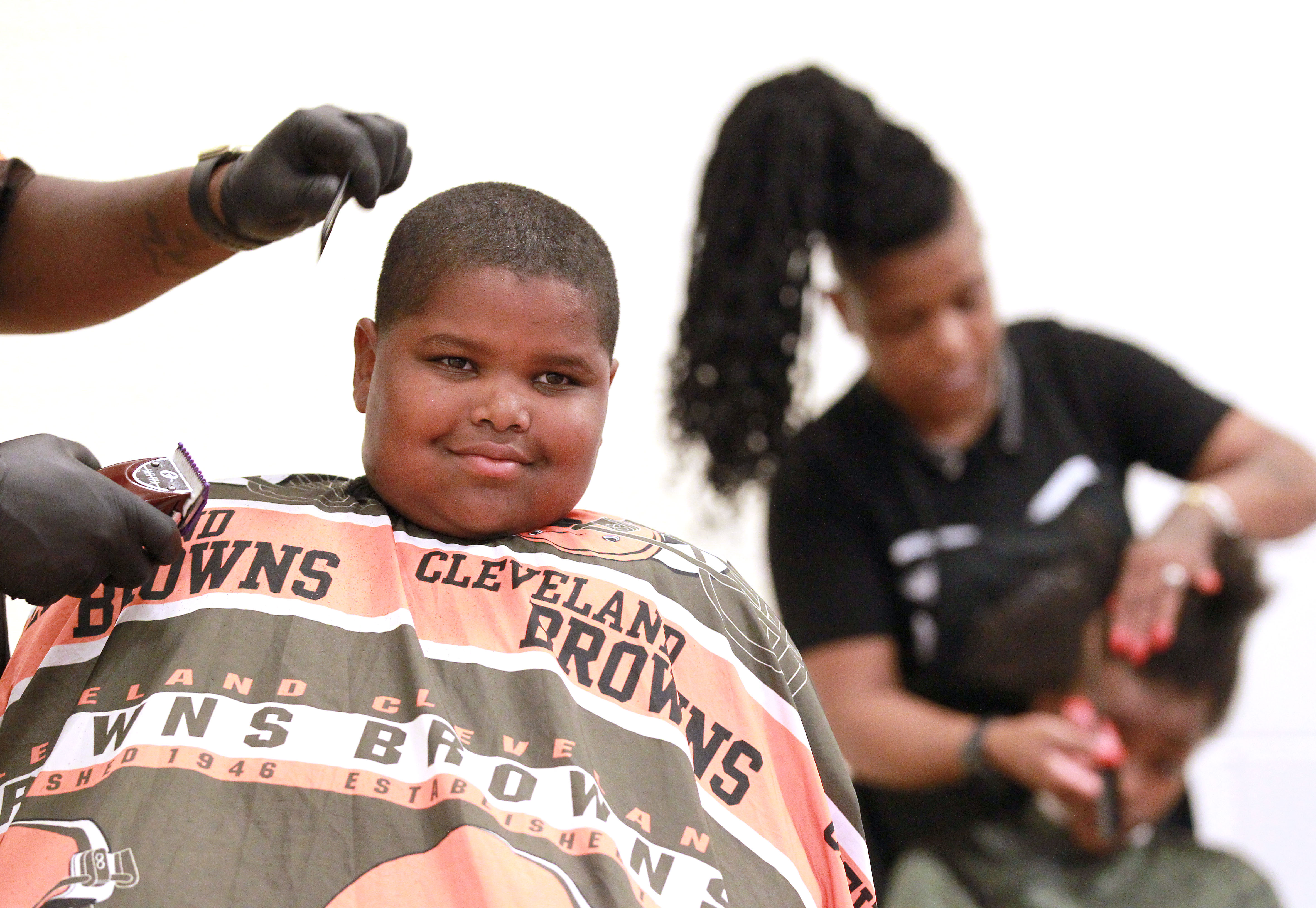 The Urban Barber Association gives free haircuts to students ...