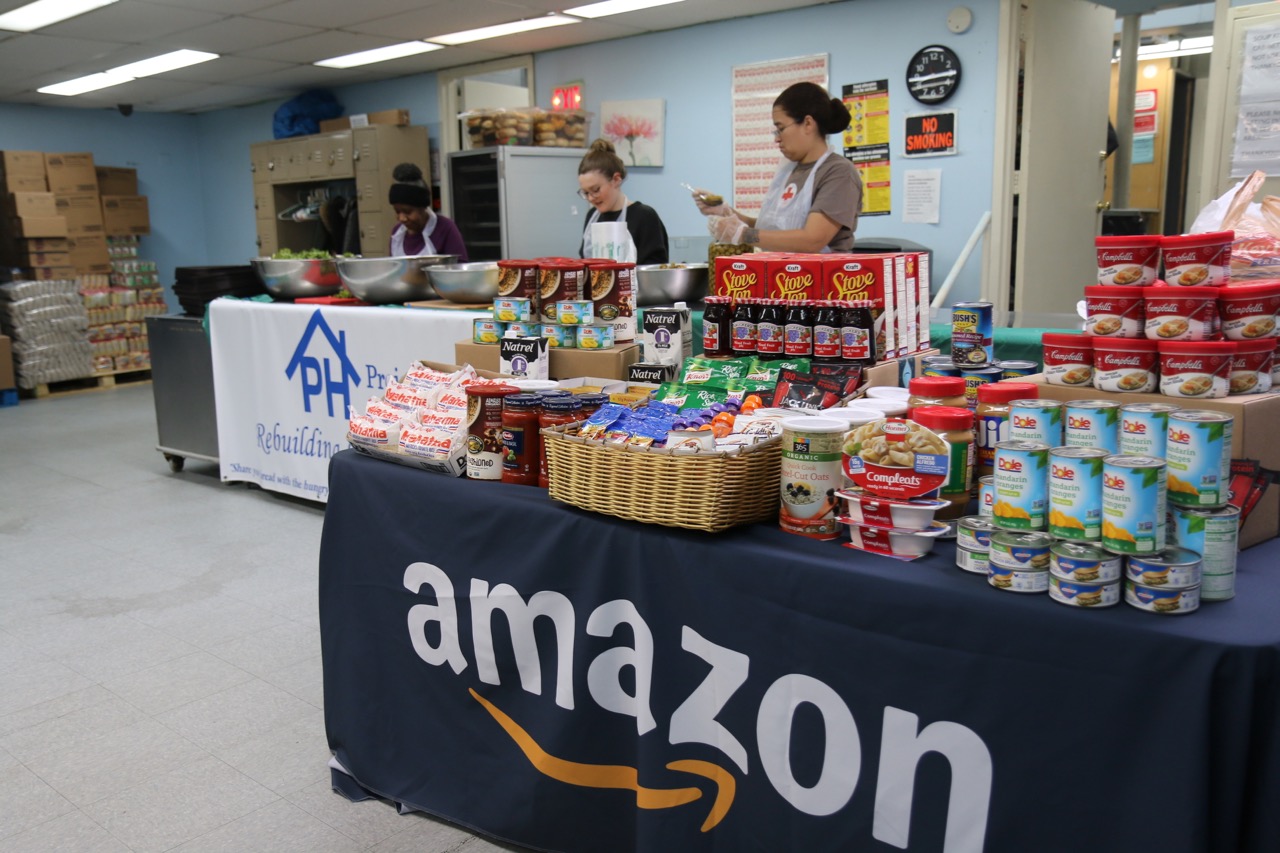 Amazon makes surprise donation of food, clothing to Project Hospitality ...