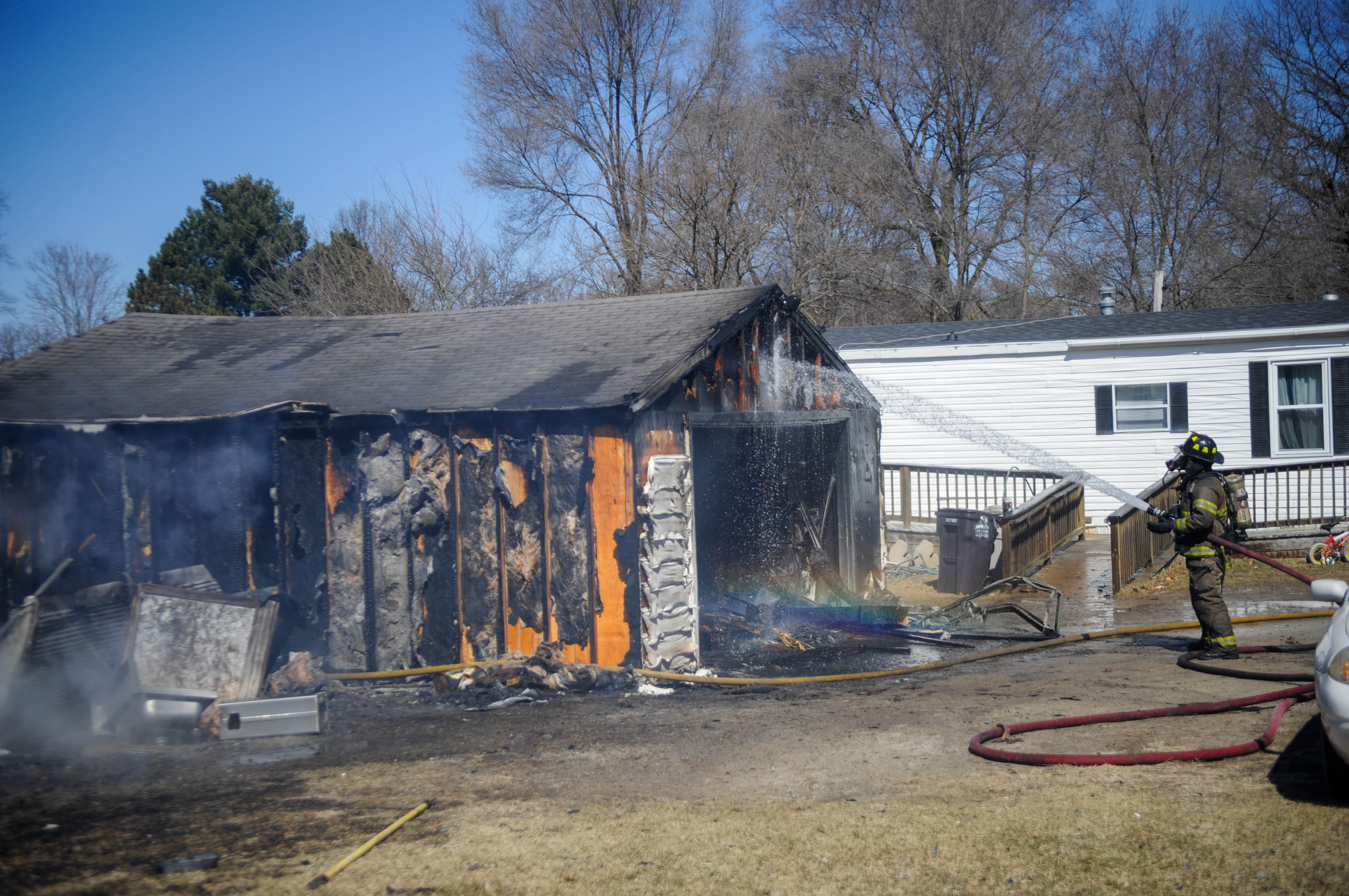 Blackman-Leoni fire crews respond to a garage fire on Manton Drive ...