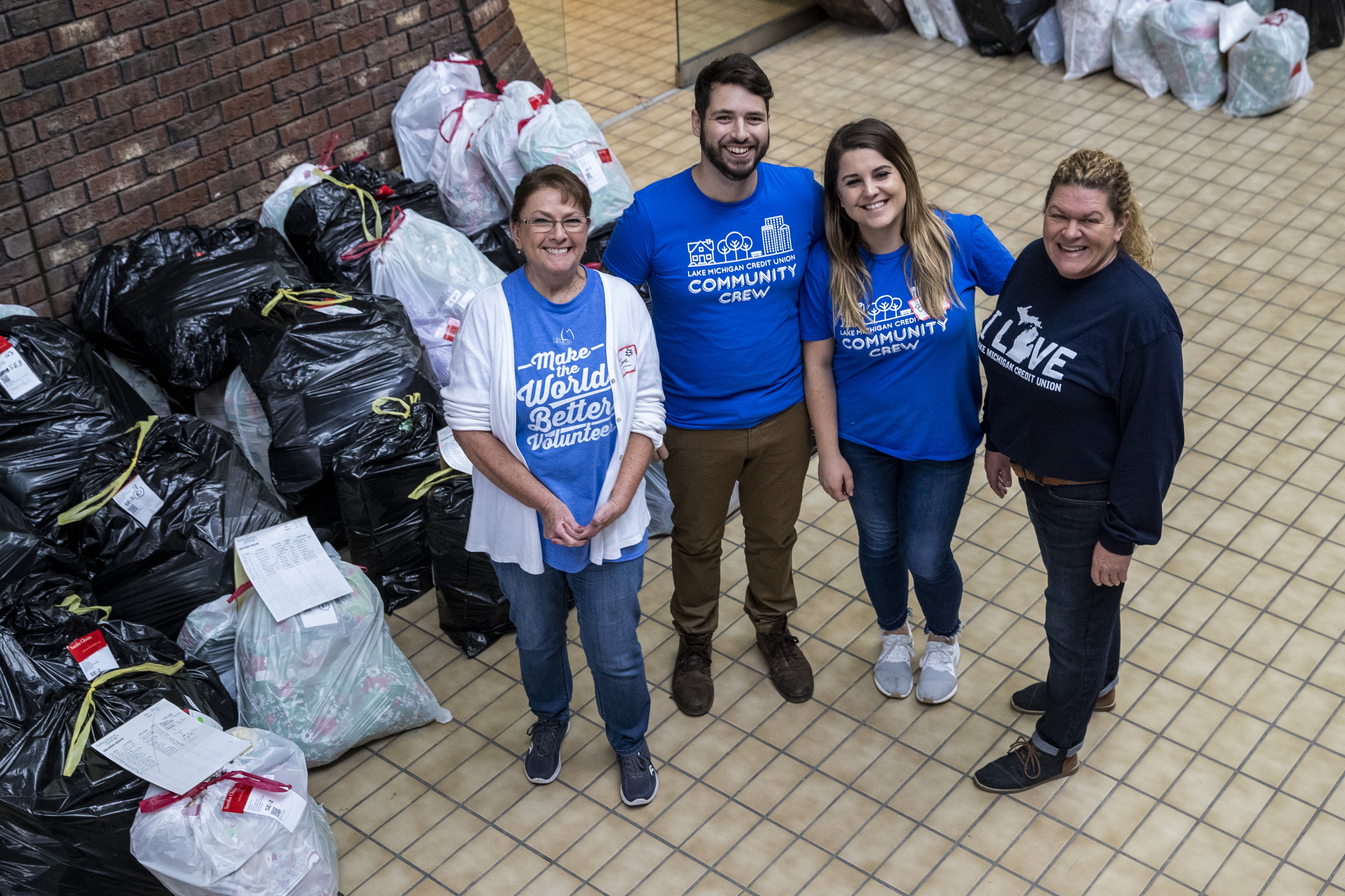 Santa Claus Girls Lake Michigan Credit Union volunteers - mlive.com