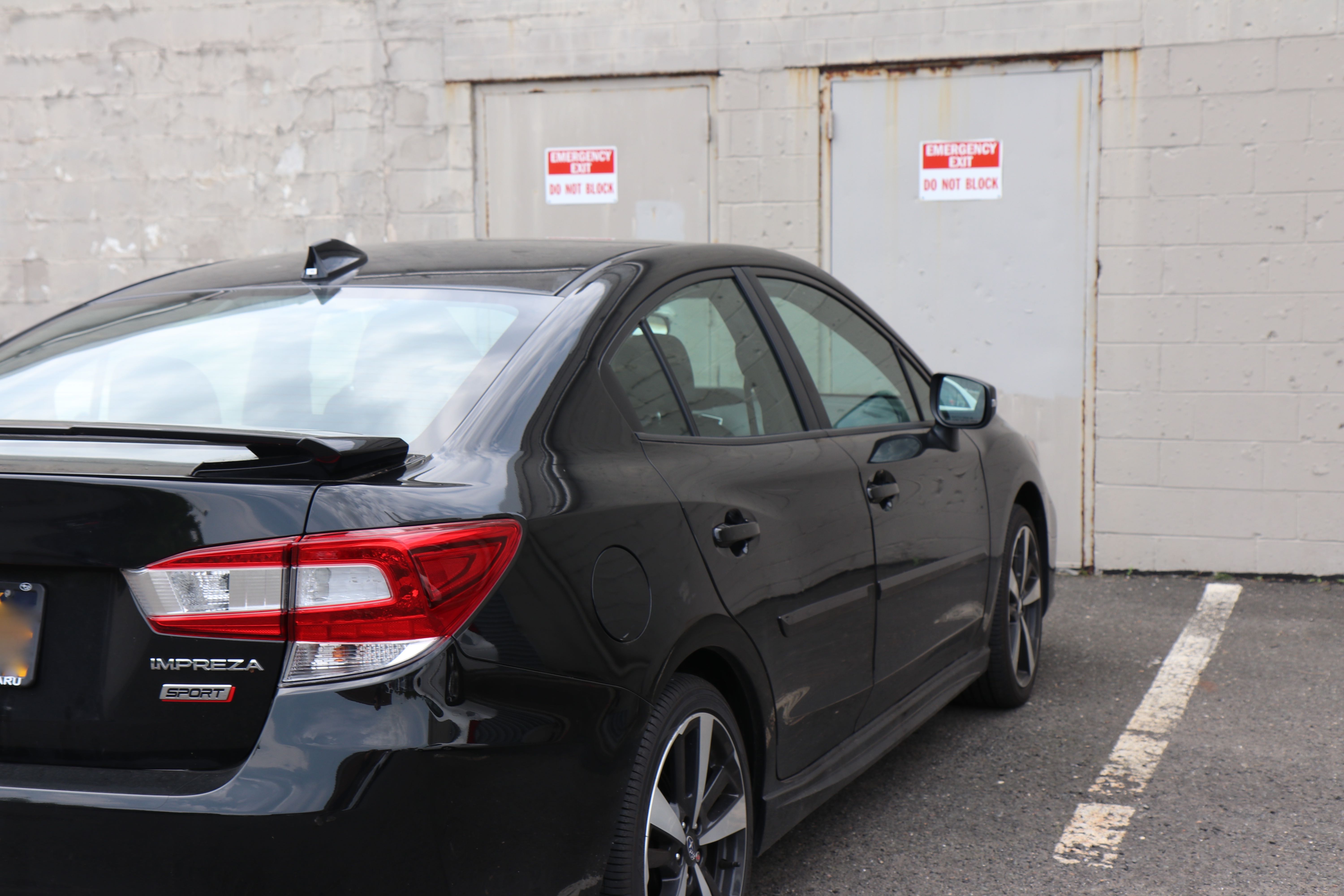 Parking spot in front of movie theater emergency exit a cause for ...