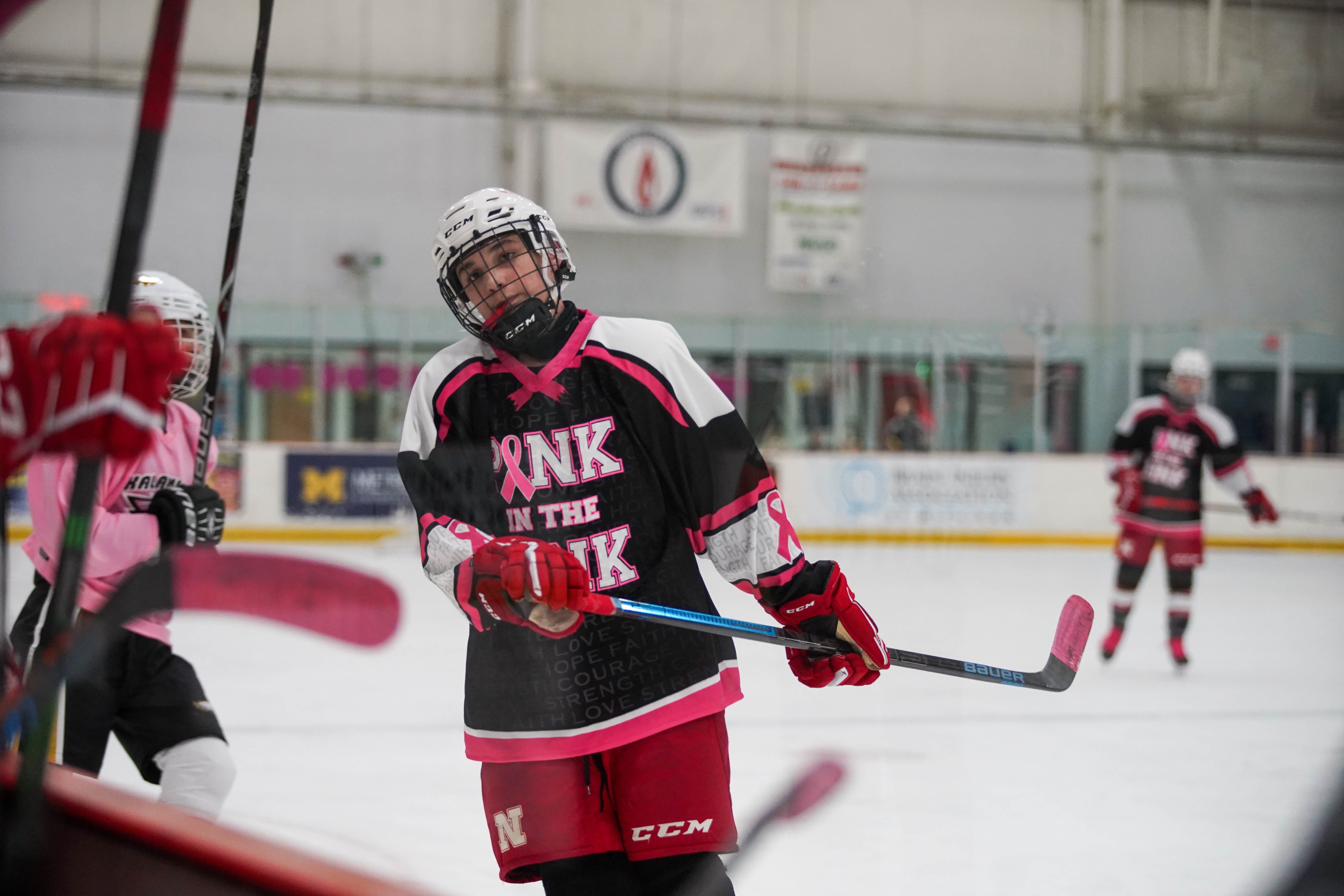 Hockey players honor cancer victims with special pink jerseys - mlive.com