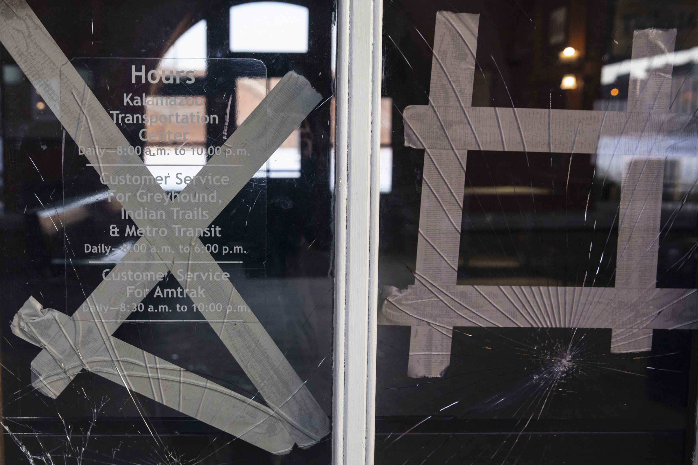 Woman arrested after breaking windows of several businesses in ...