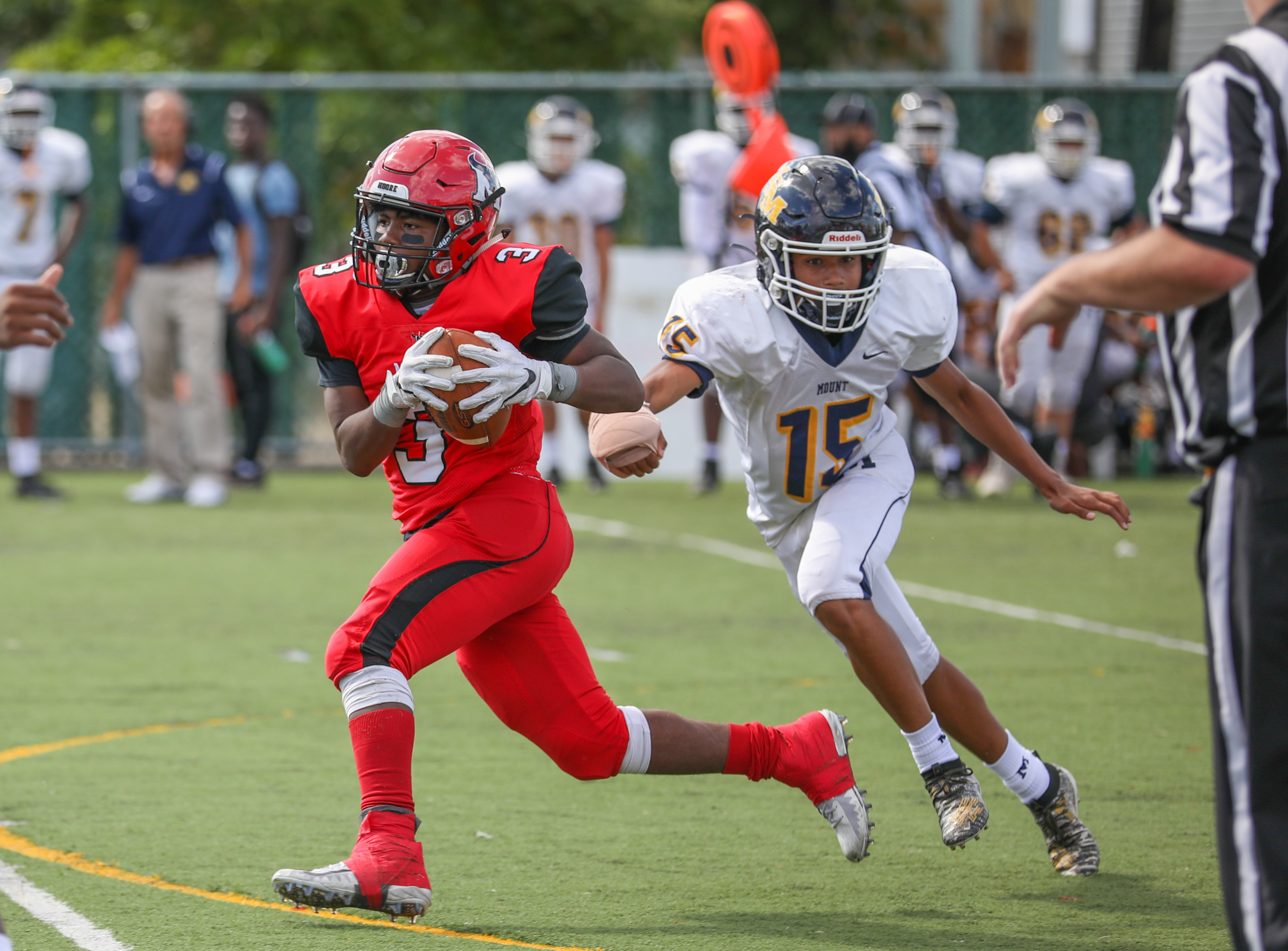 PHOTOS: Moore Catholic dominates Mt. St. Michael 42-0 in season opening ...