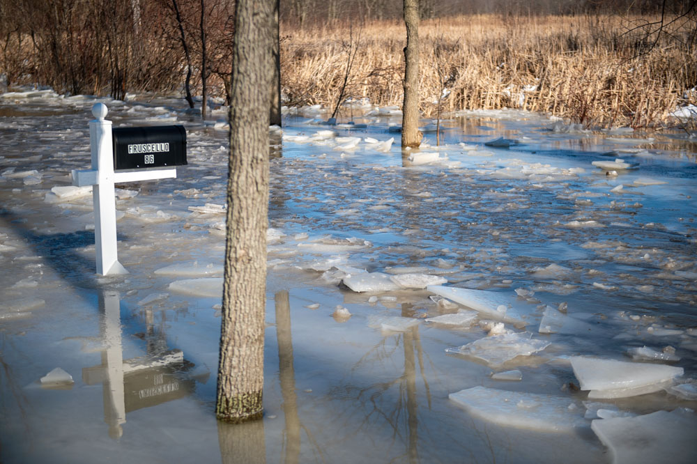 Deep snow, slushy floods left over from weekend blizzard in Upstate New ...