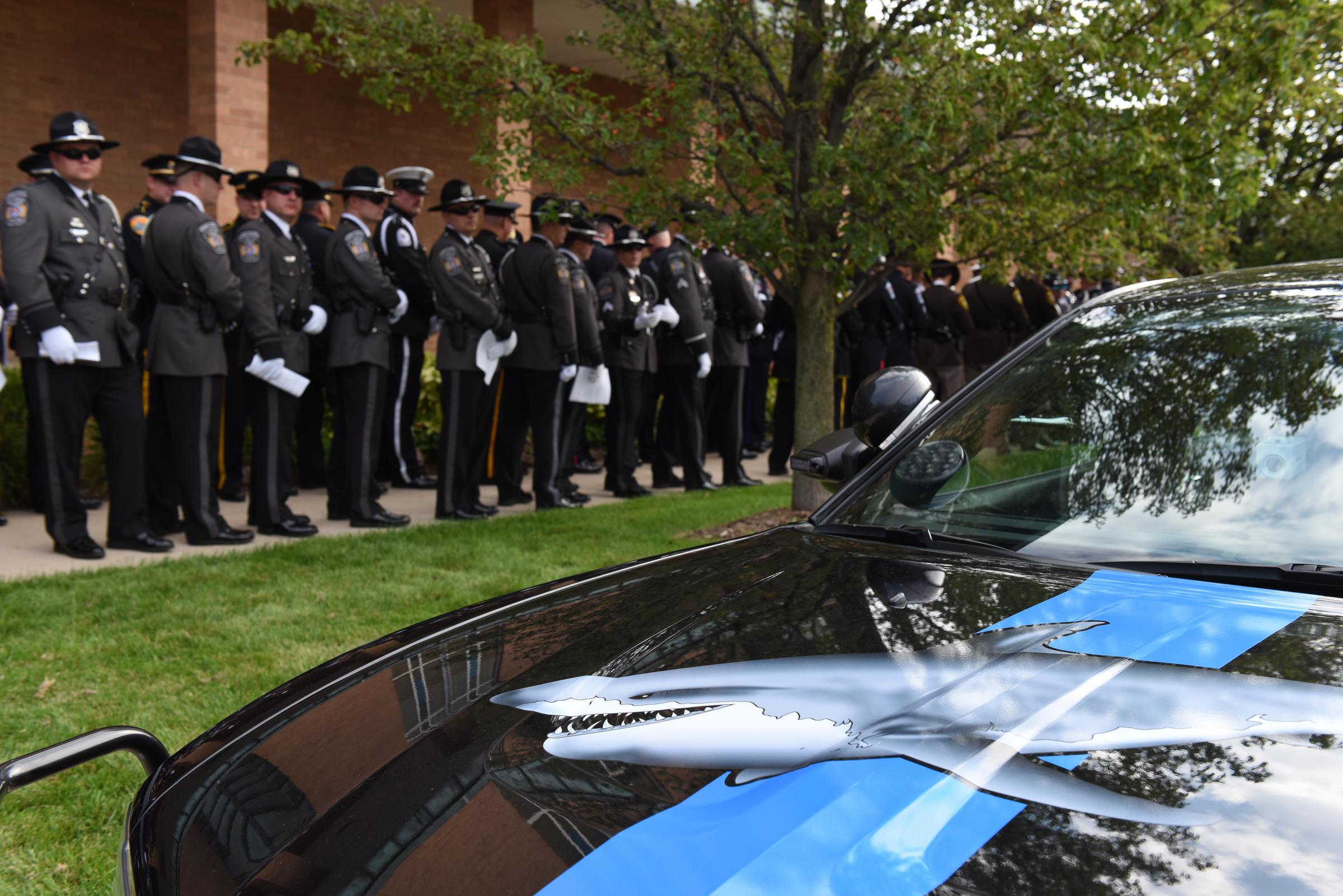 Detroit police Sgt. Kenneth Steil and Marquise Cromer - mlive.com
