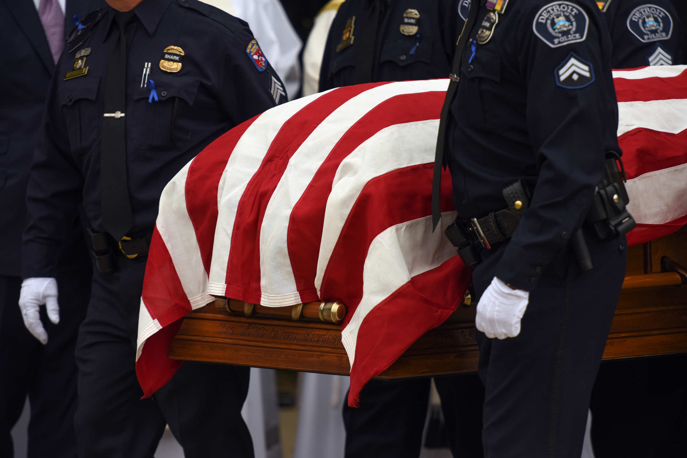 Detroit police Sgt. Kenneth Steil and Marquise Cromer - mlive.com