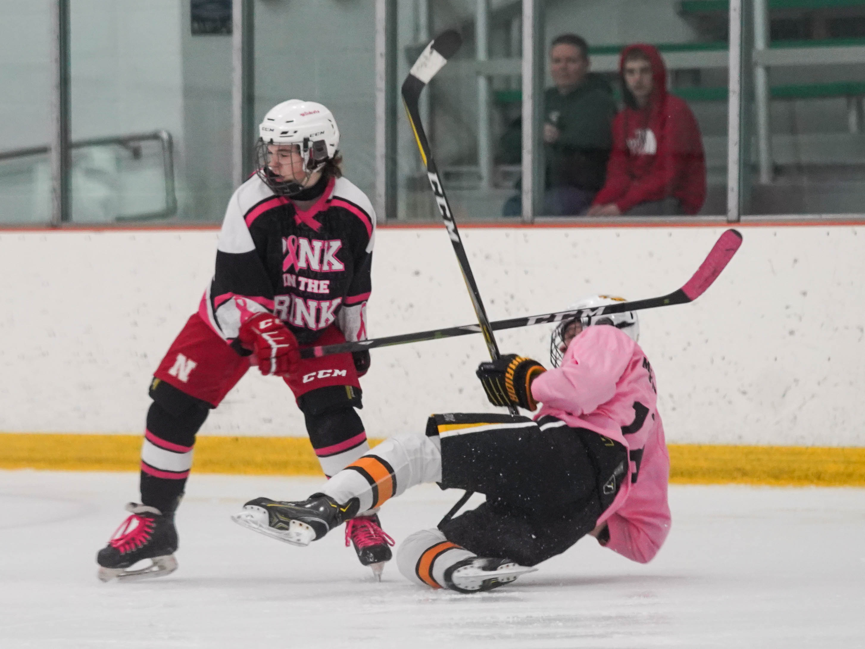Hockey players honor cancer victims with special pink jerseys - mlive.com