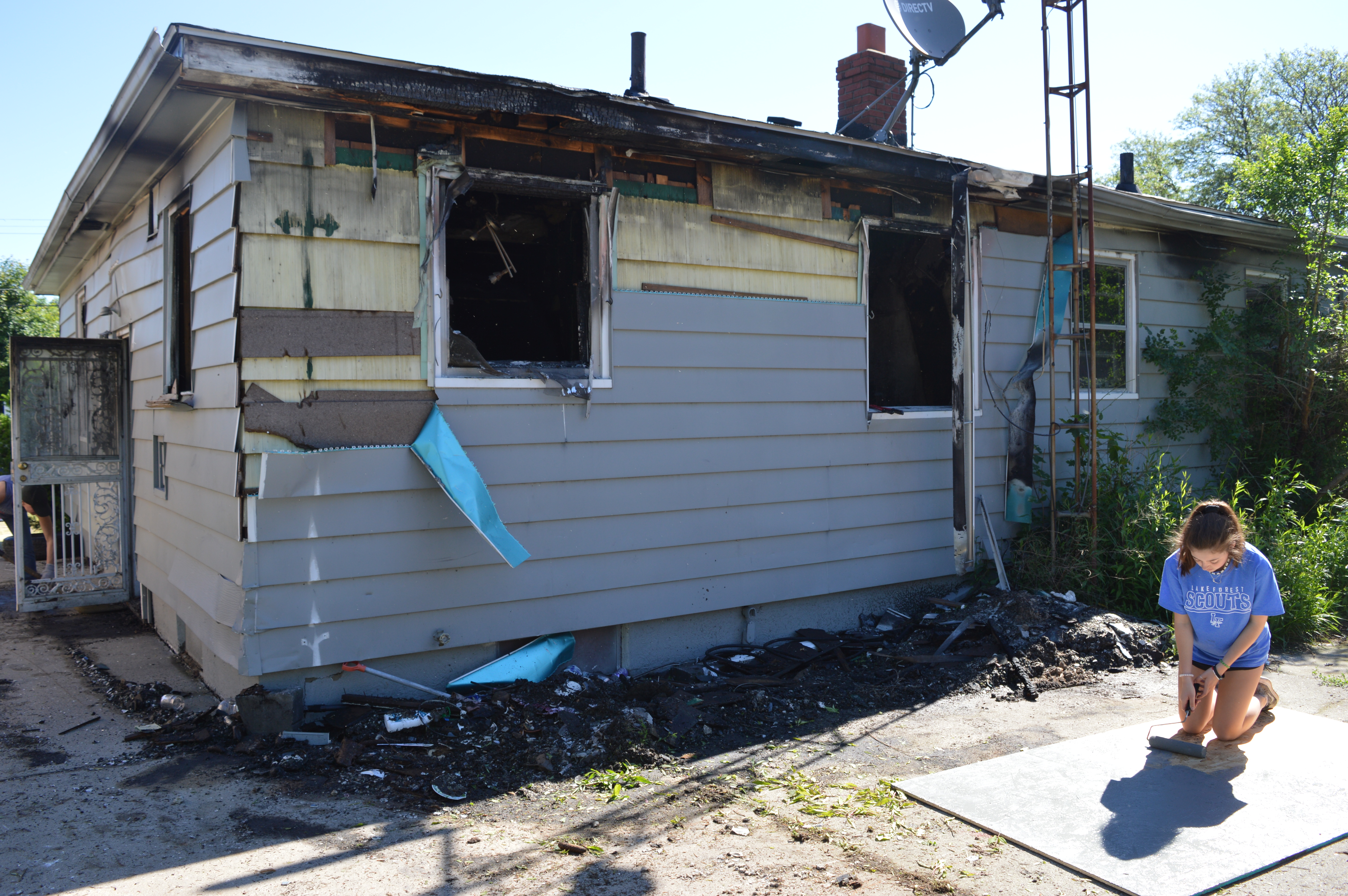Volunteers help tackle blighted properties in Flint - mlive.com