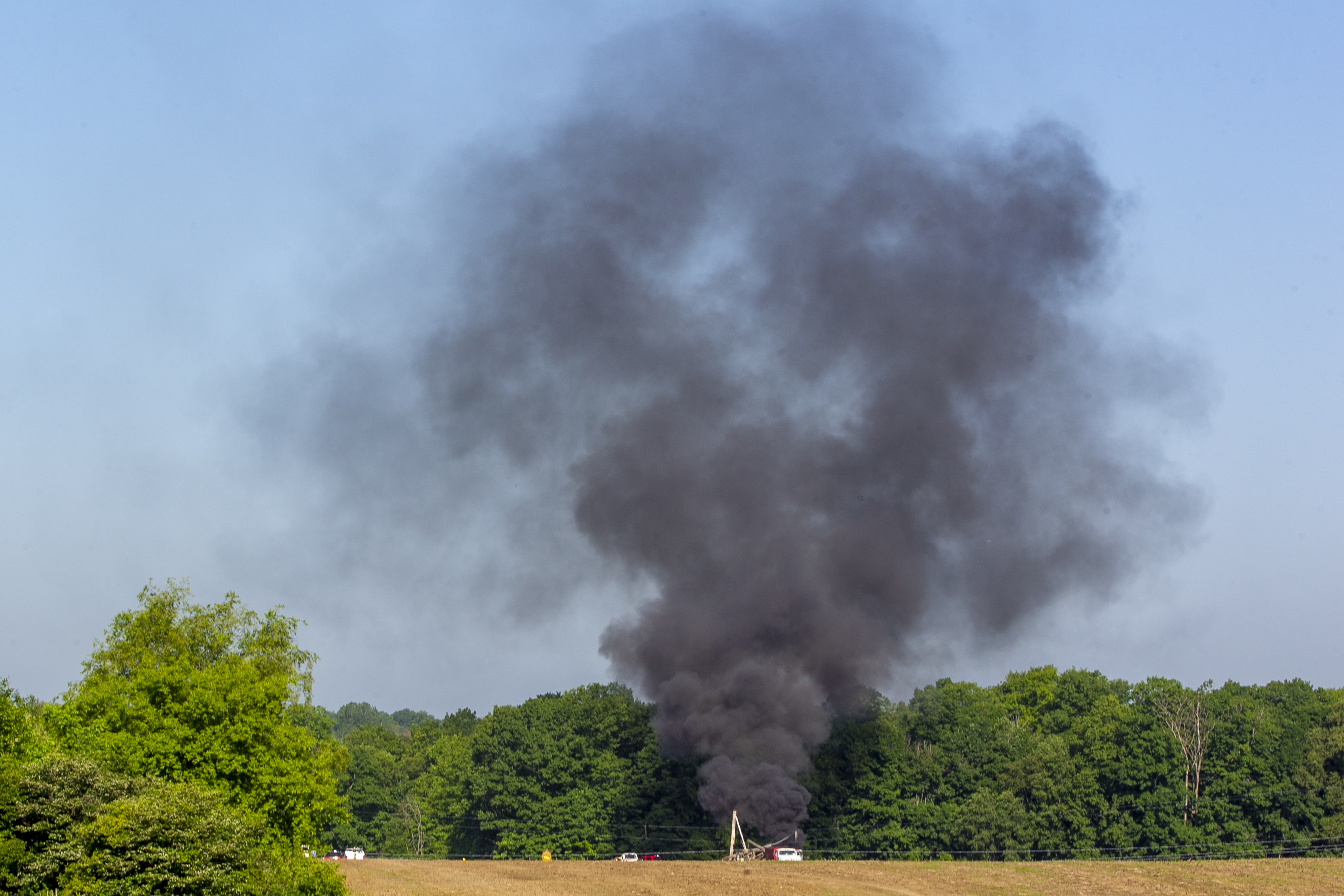 Farmer trapped after power lines fall on tractor - mlive.com