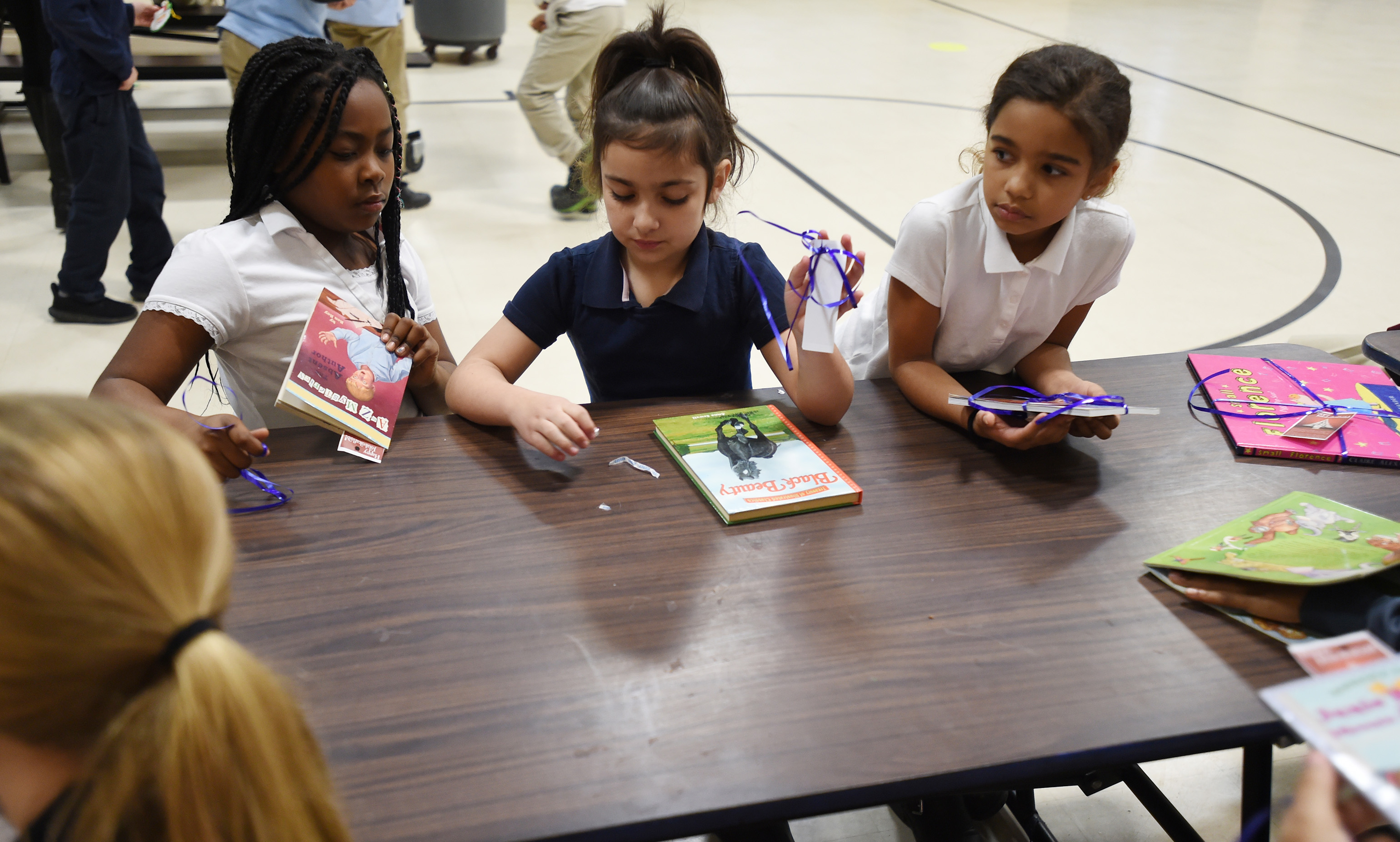 Sharp Park Academy students get books as part of Sam's Book Flood ...