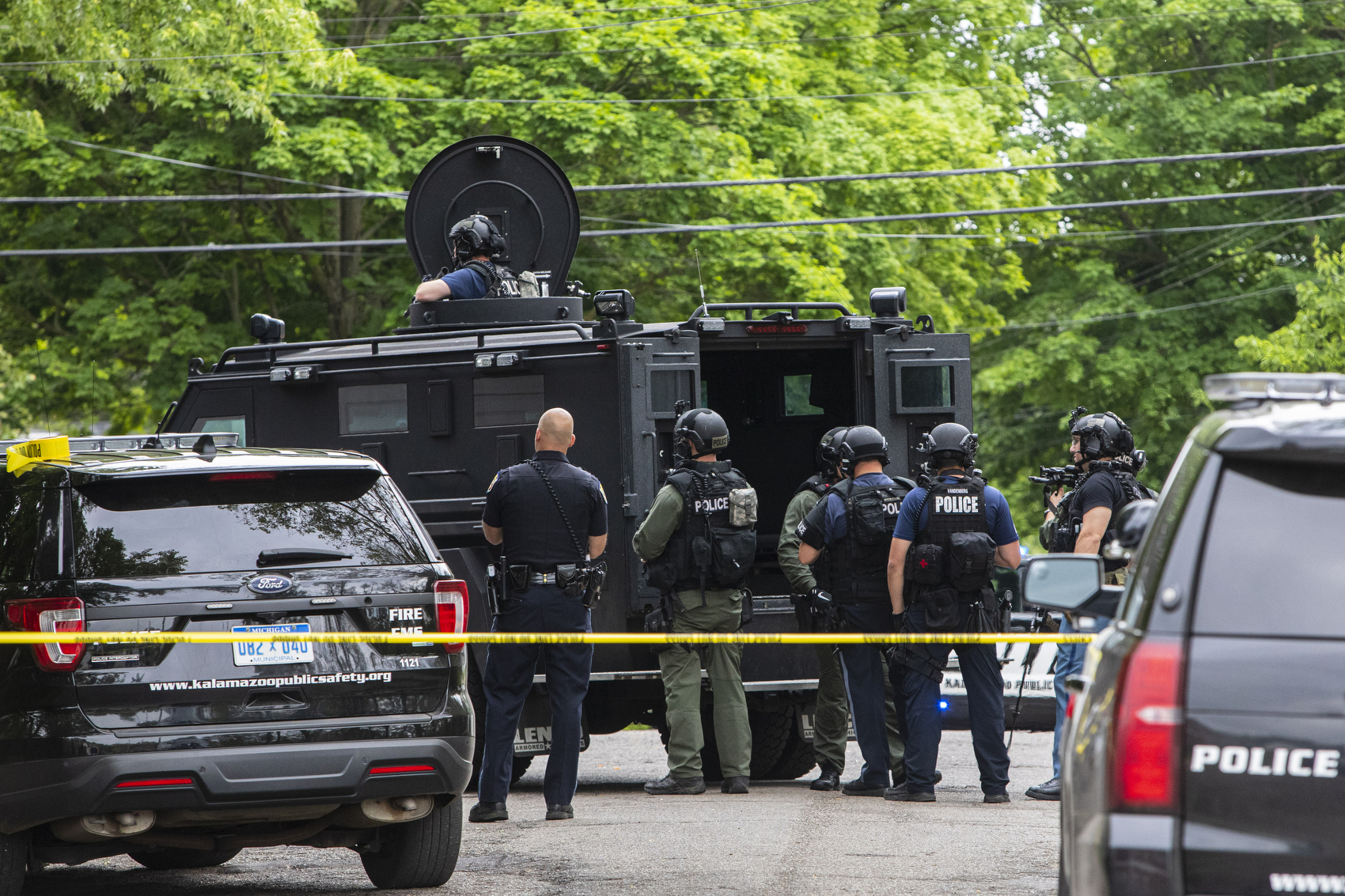 Police surround home on Kalamazoo's Southeast side - mlive.com