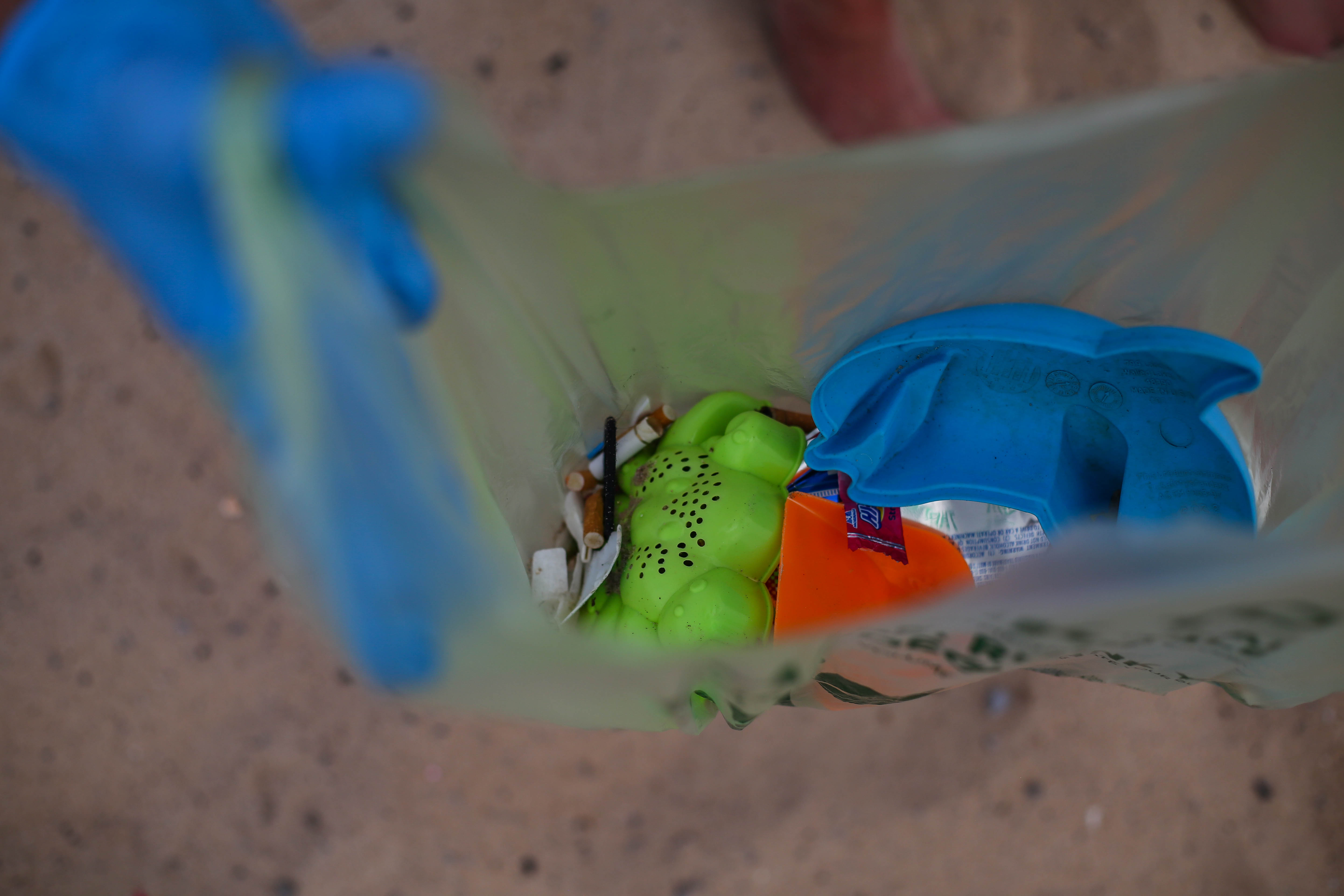 Local clothing company organizes beach clean up to collect litter ...