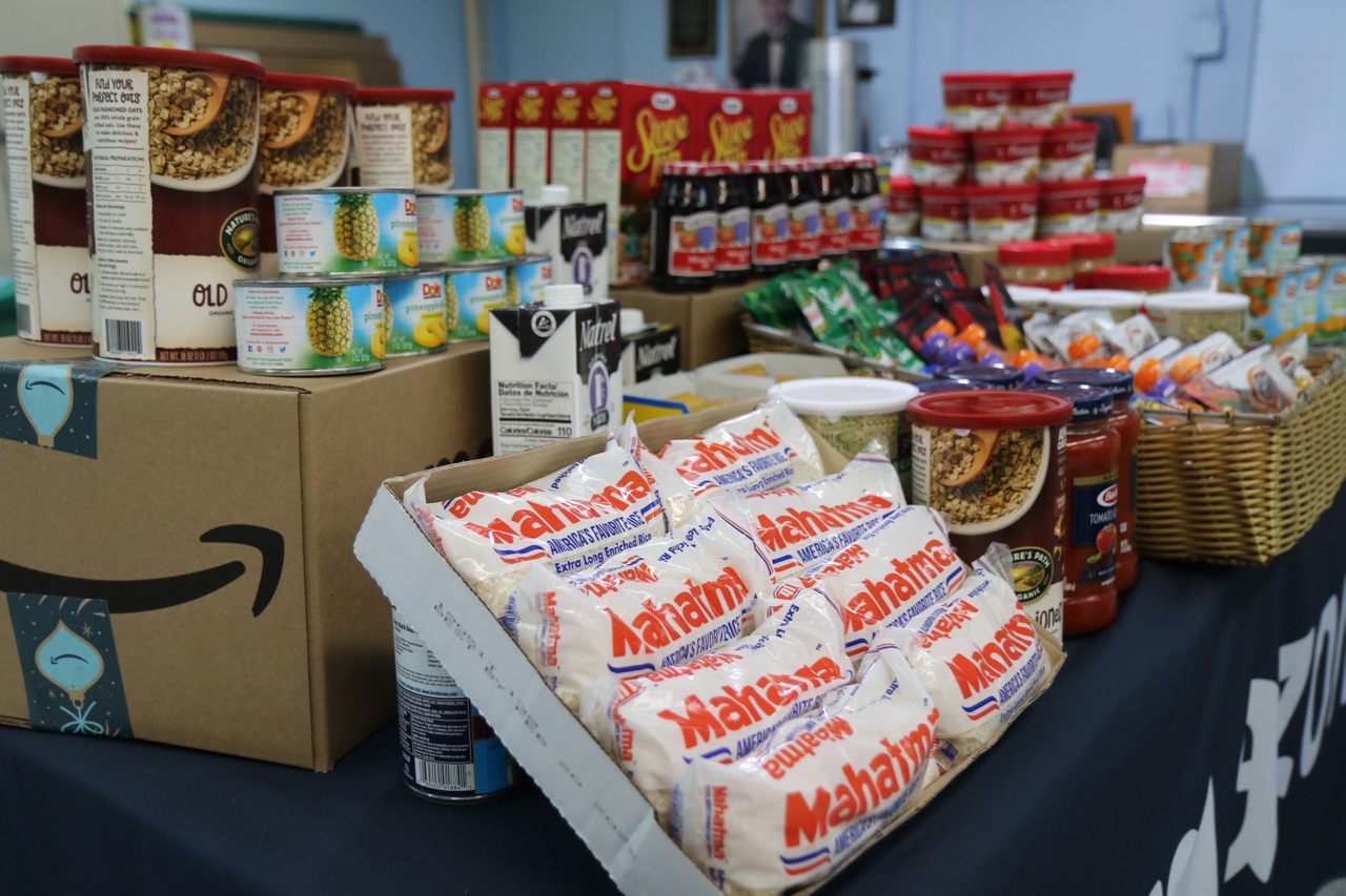 Amazon makes surprise donation of food, clothing to Project Hospitality ...