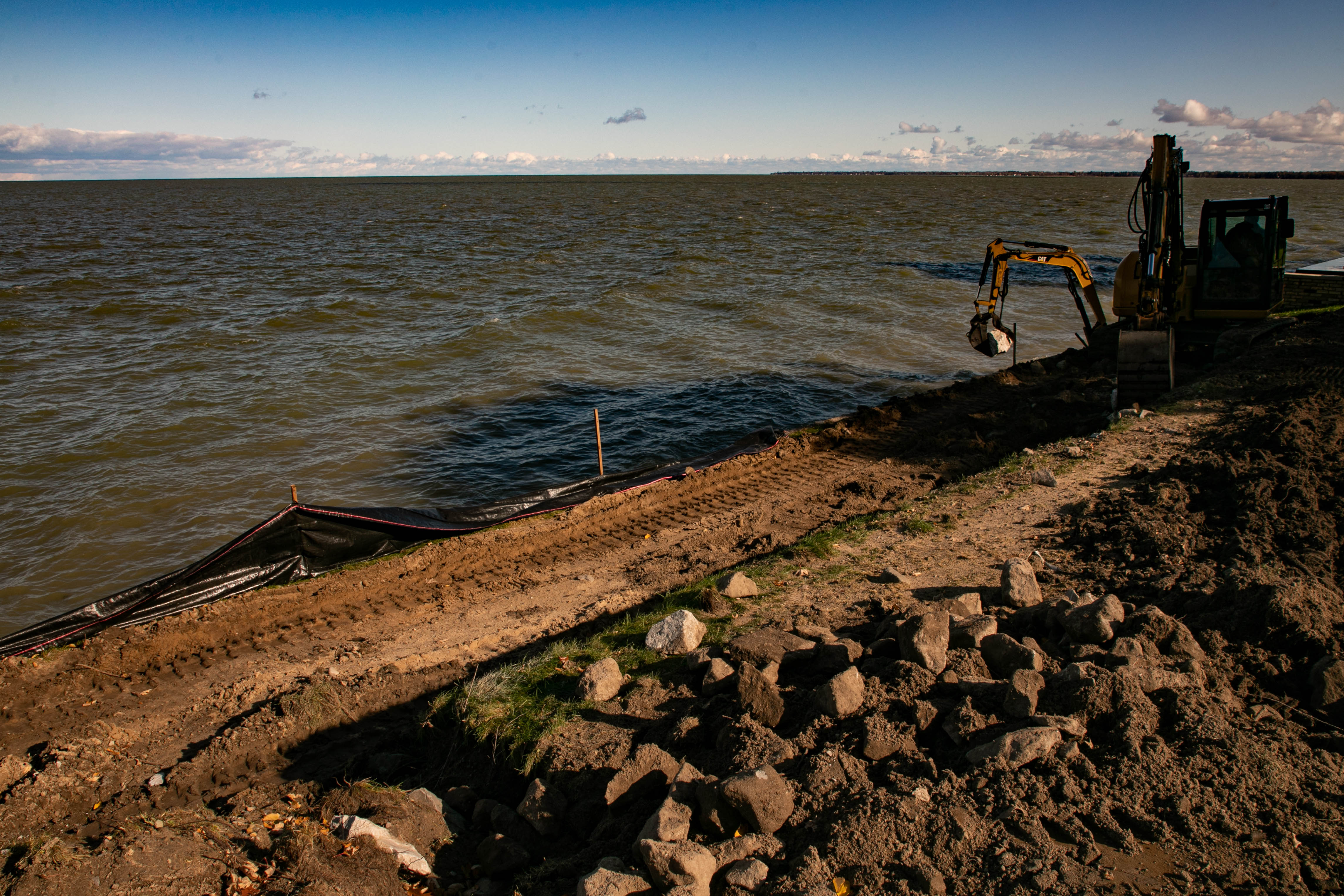 High water levels causing erosion in Sand Point homeowners yards ...