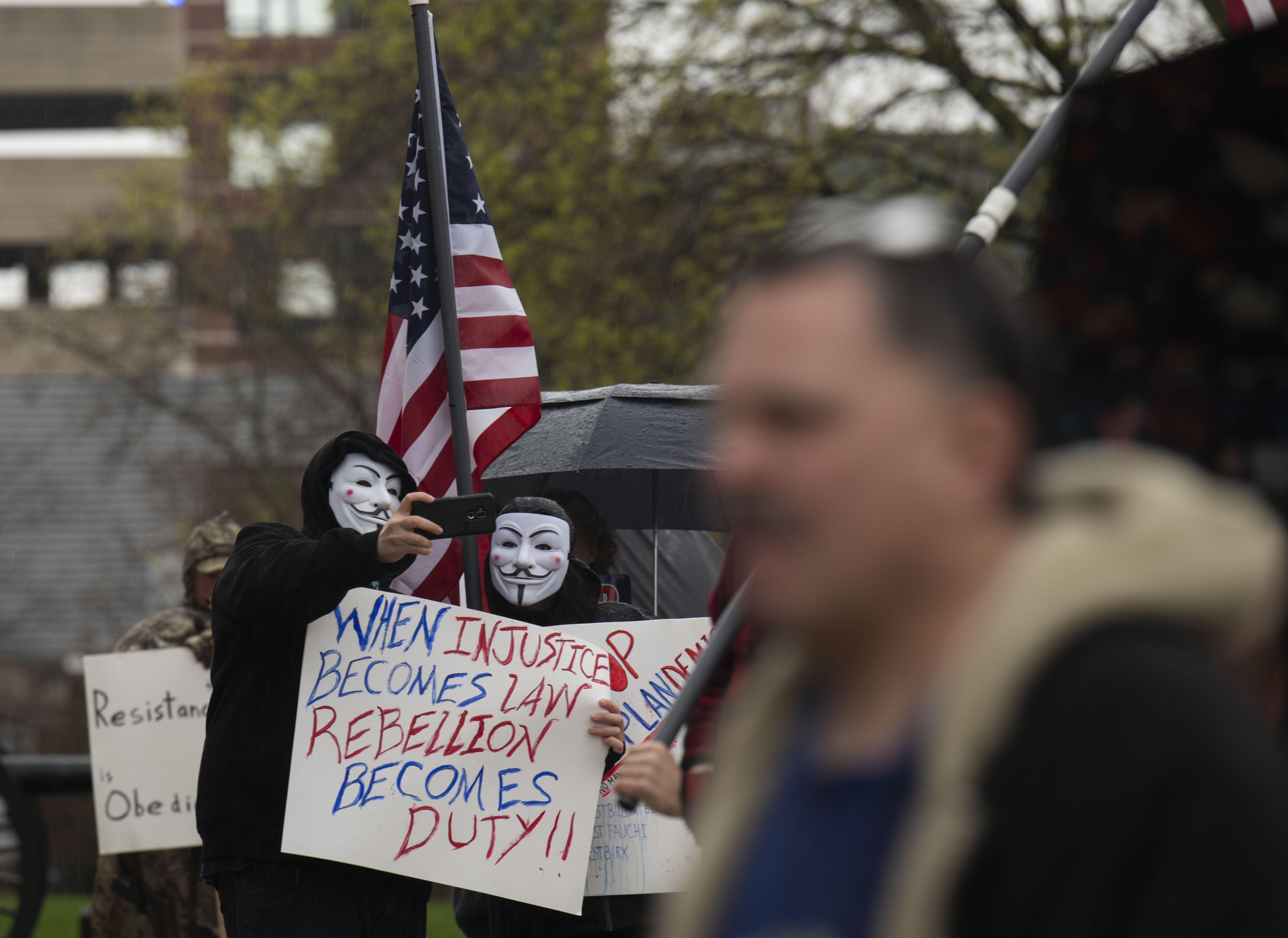 Signs from "American Patriot Rally on Capitol Lawn" in Lansing Michigan ...