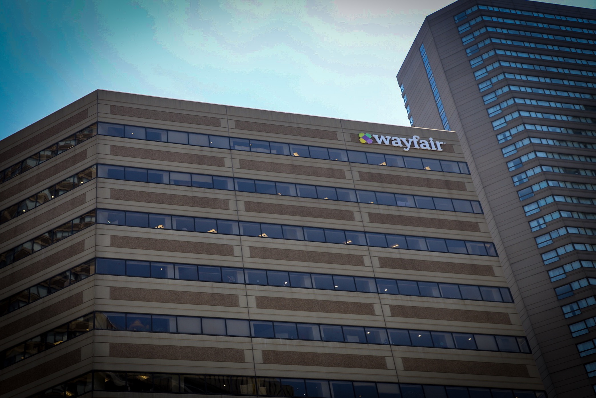 Photos: Wayfair employees stage walkout to protest contract involving ...