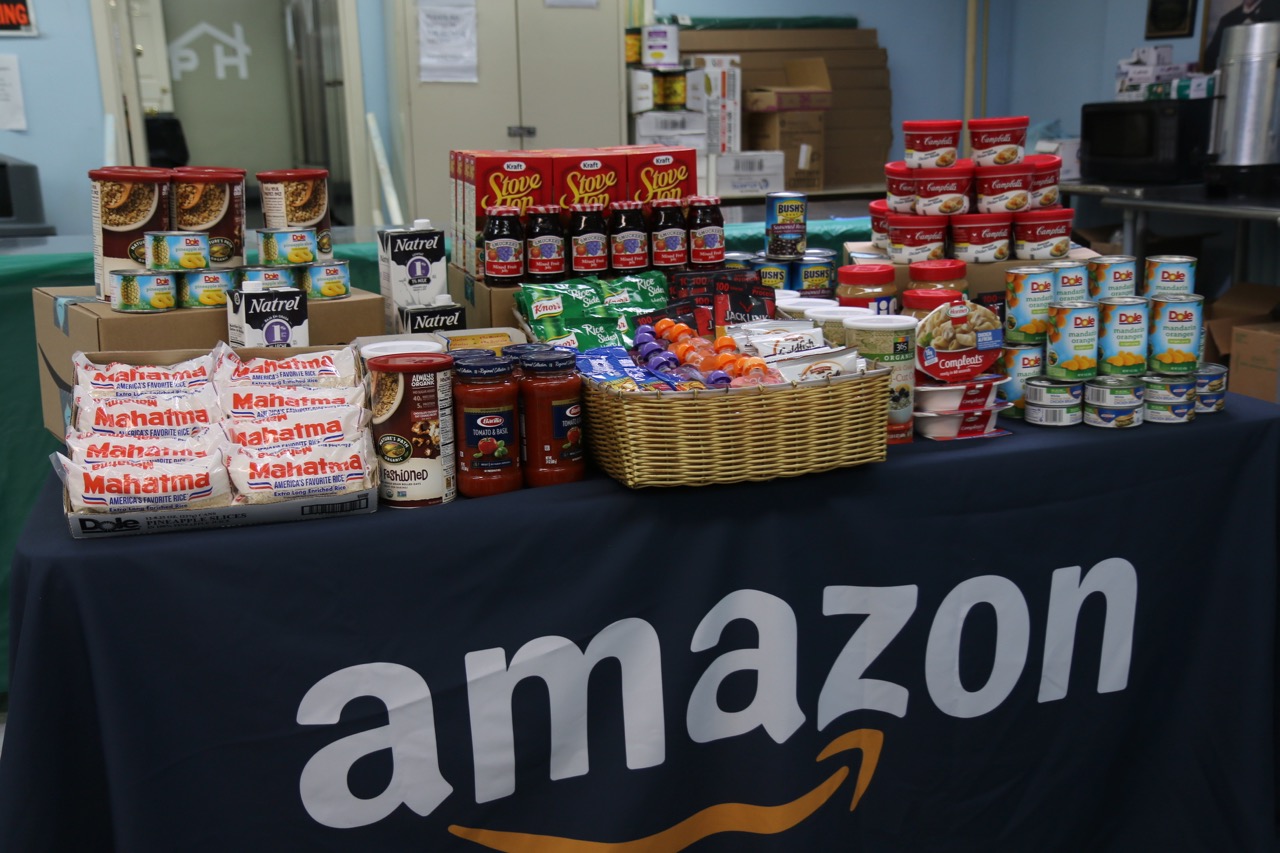 Amazon makes surprise donation of food, clothing to Project Hospitality ...