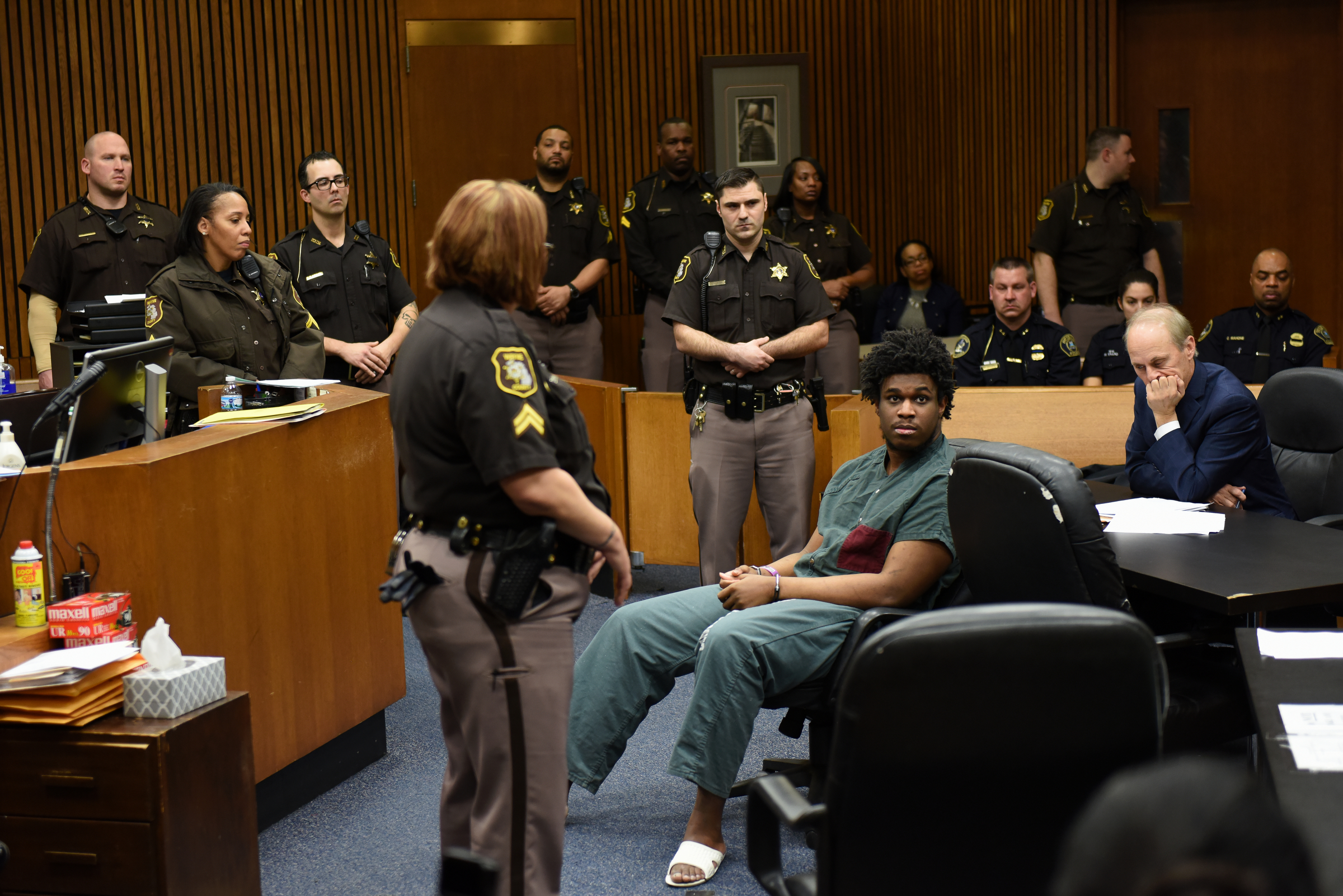 Detroit police Sgt. Kenneth Steil and Marquise Cromer - mlive.com