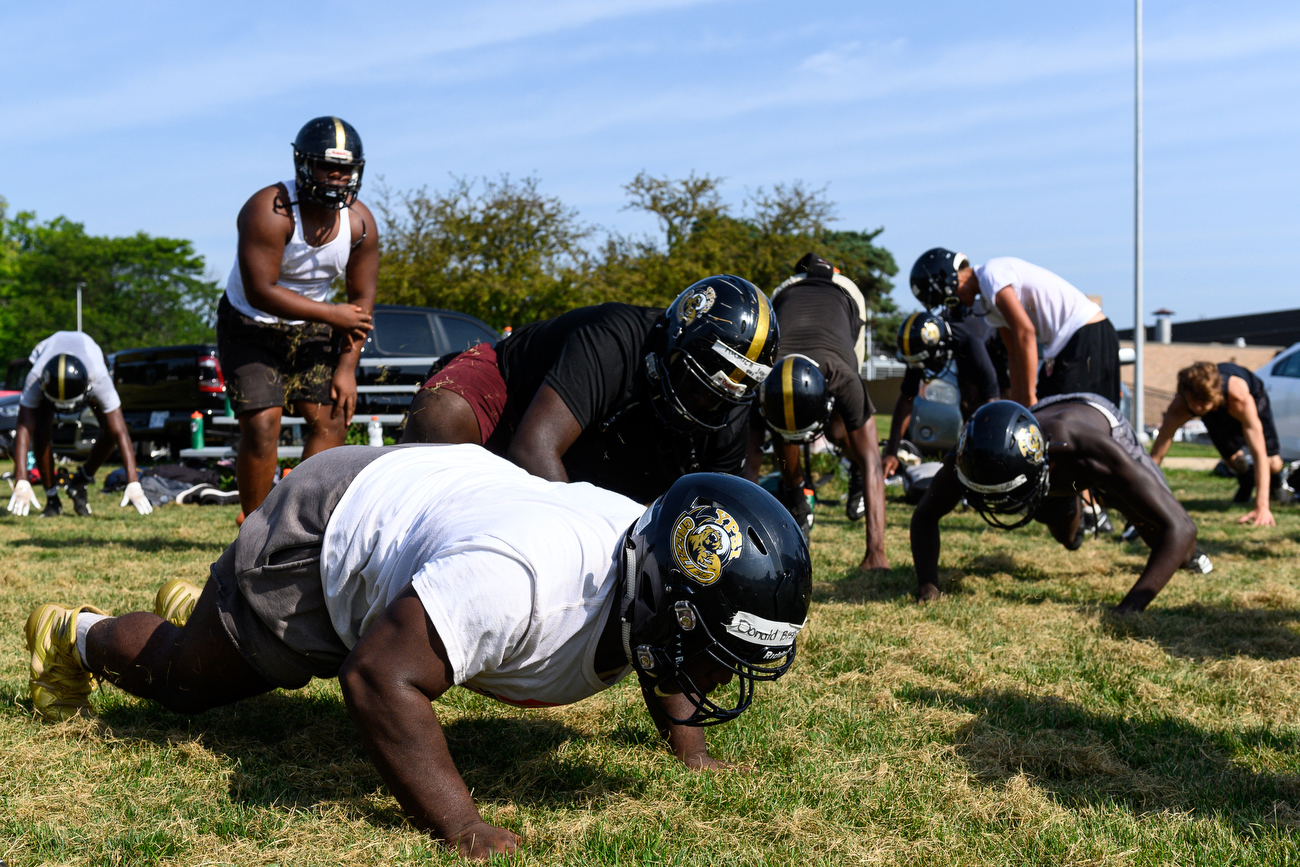 First day of football practice at Ypsilanti Community High School ...