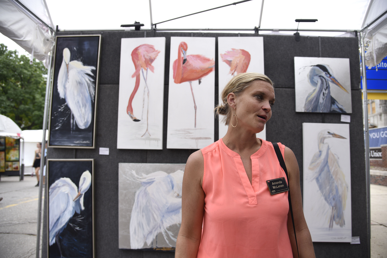 Photographer at art fair shows a block away from his former student ...