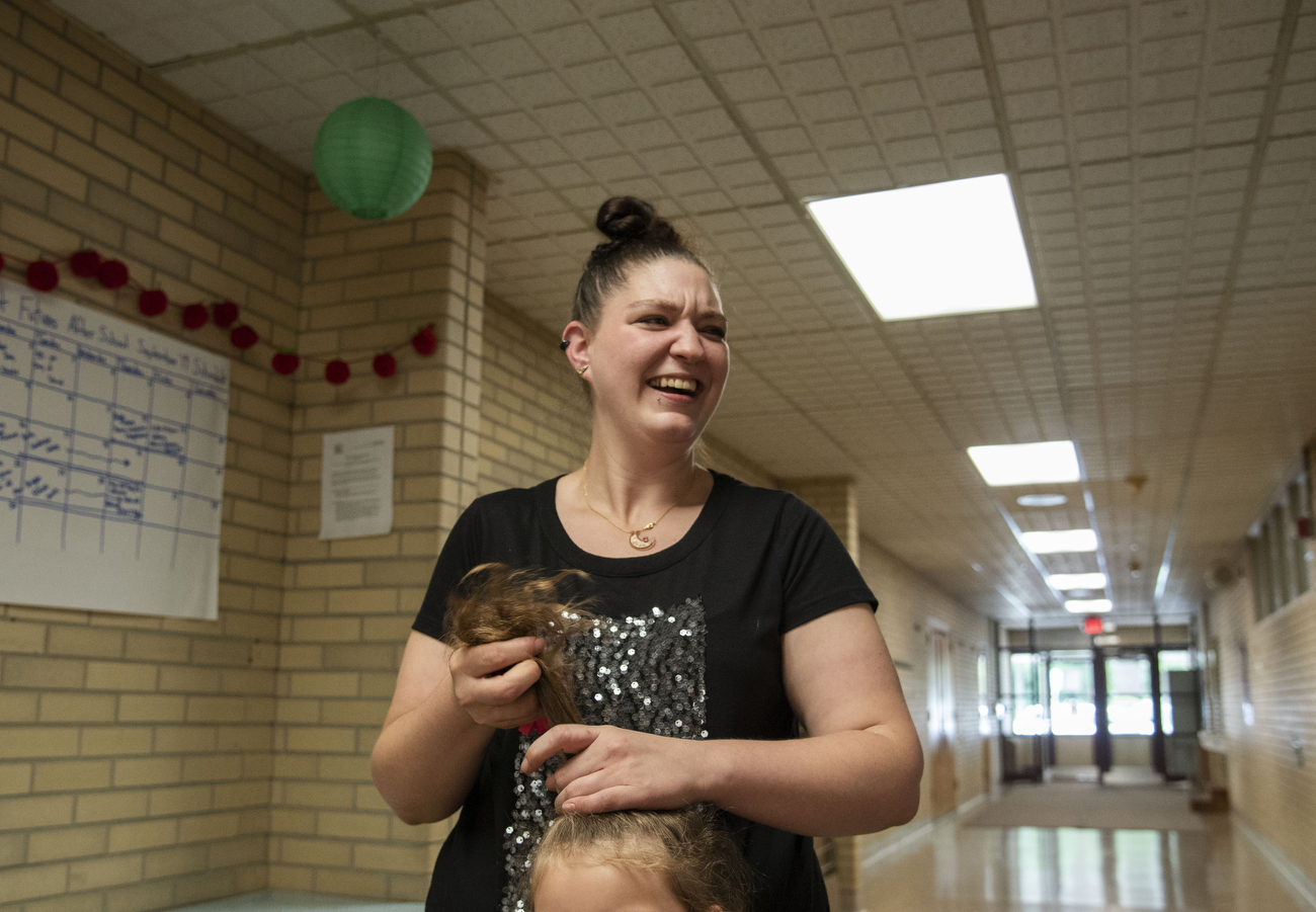 Ypsilanti mom picks up her daughter from school after bus scare - mlive.com
