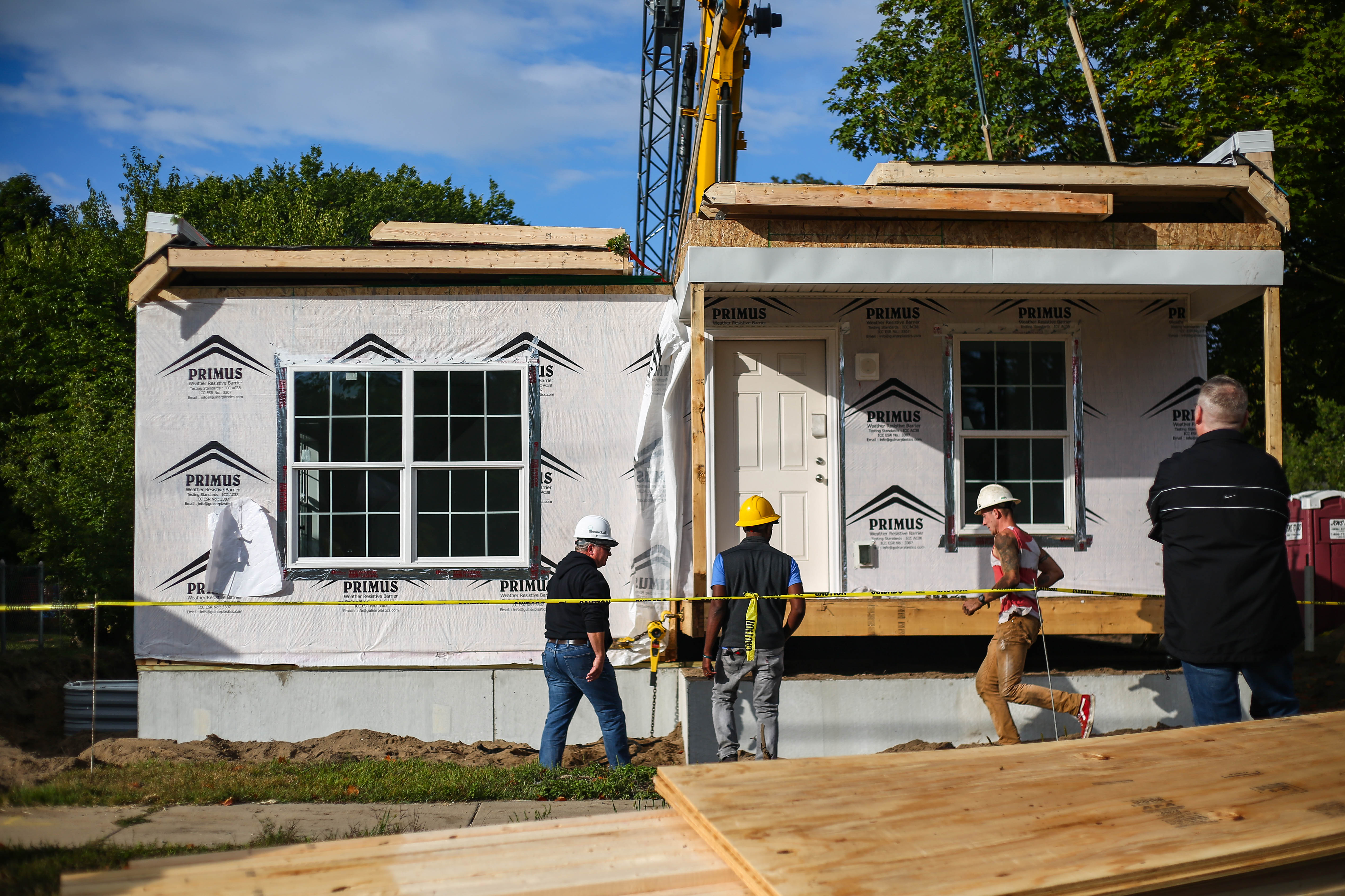 Crane lowers modular home onto foundation - mlive.com
