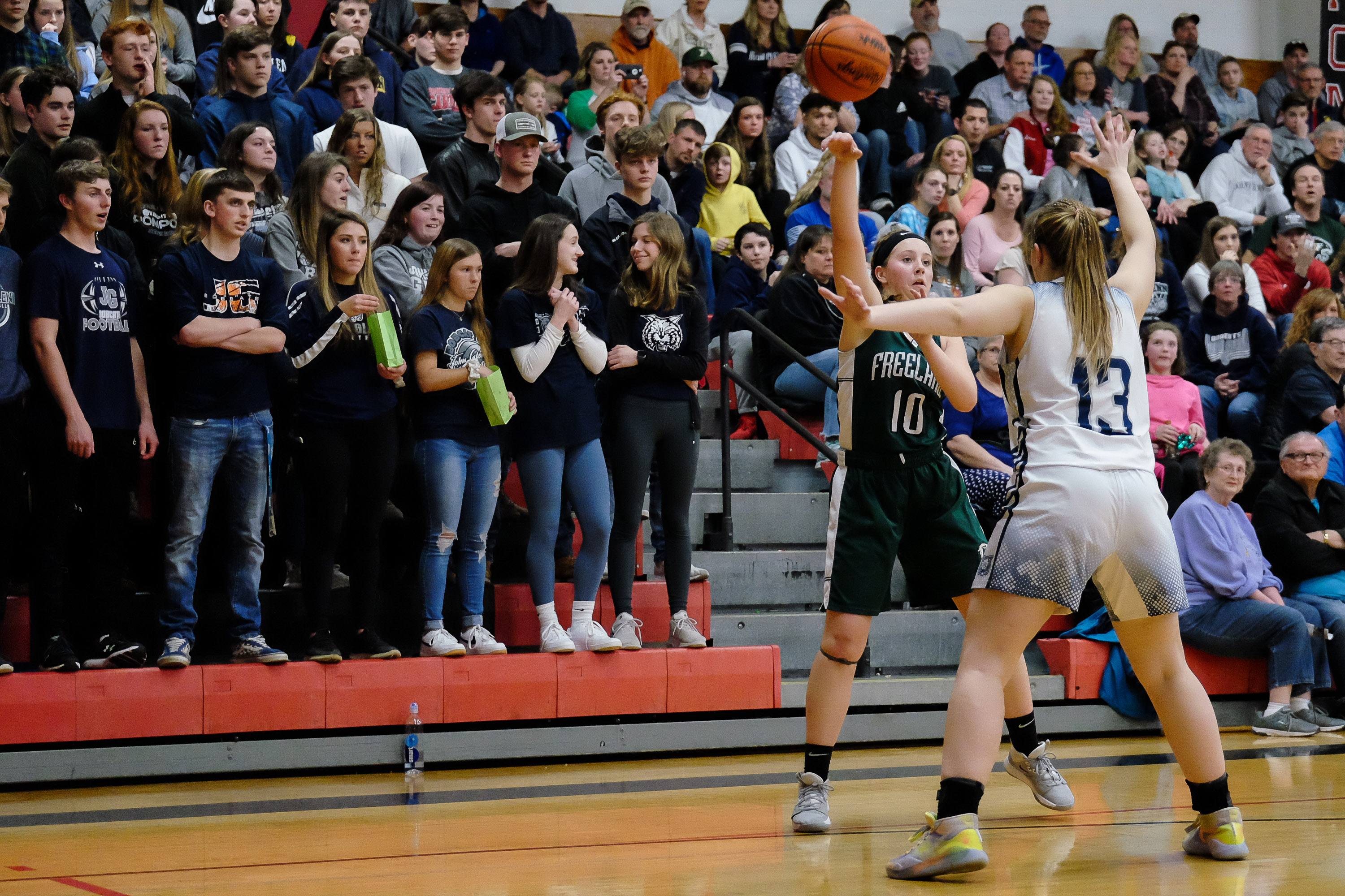 Freeland girls basketball defeats John Glenn 64-38 to win district ...