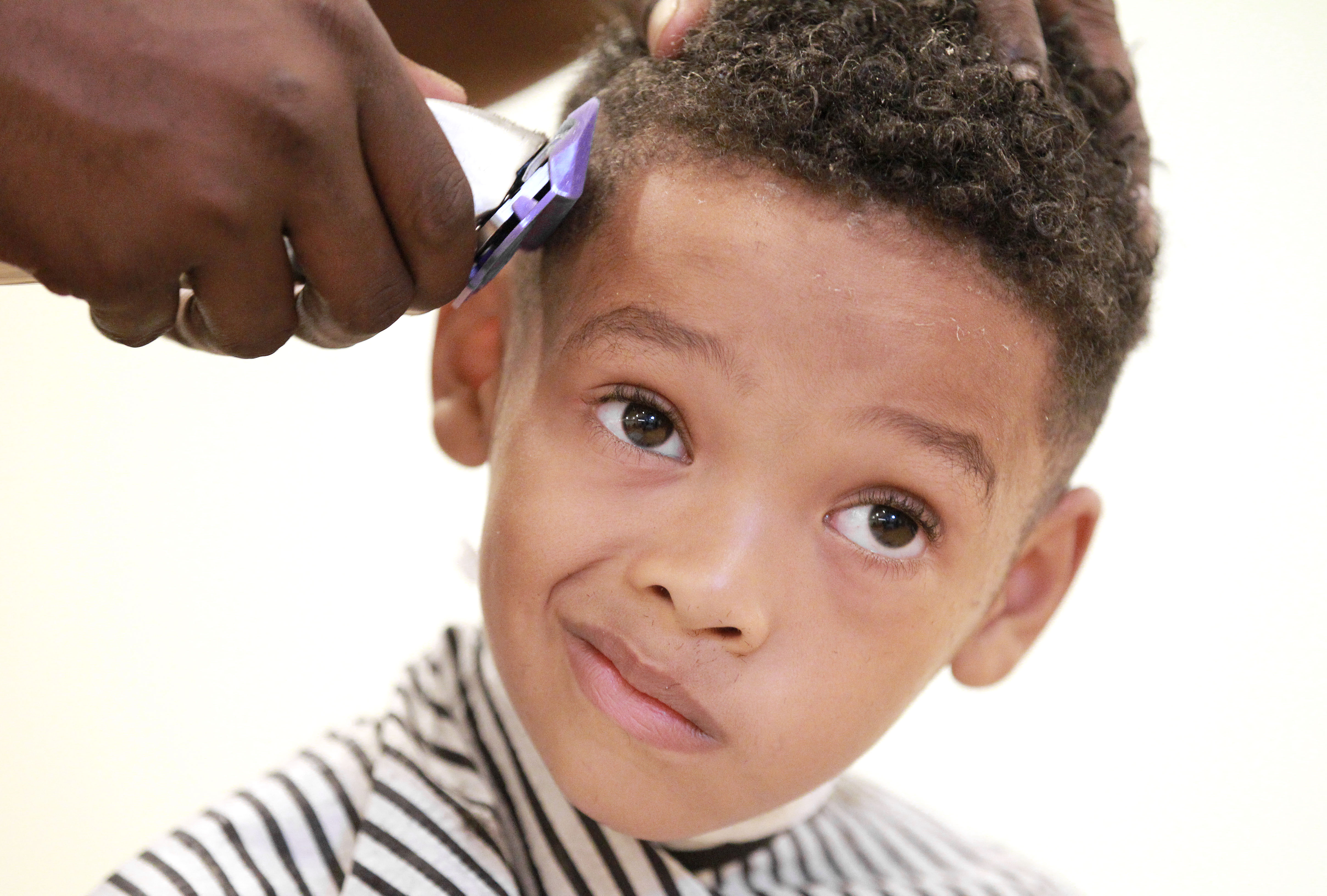 The Urban Barber Association gives free haircuts to students ...