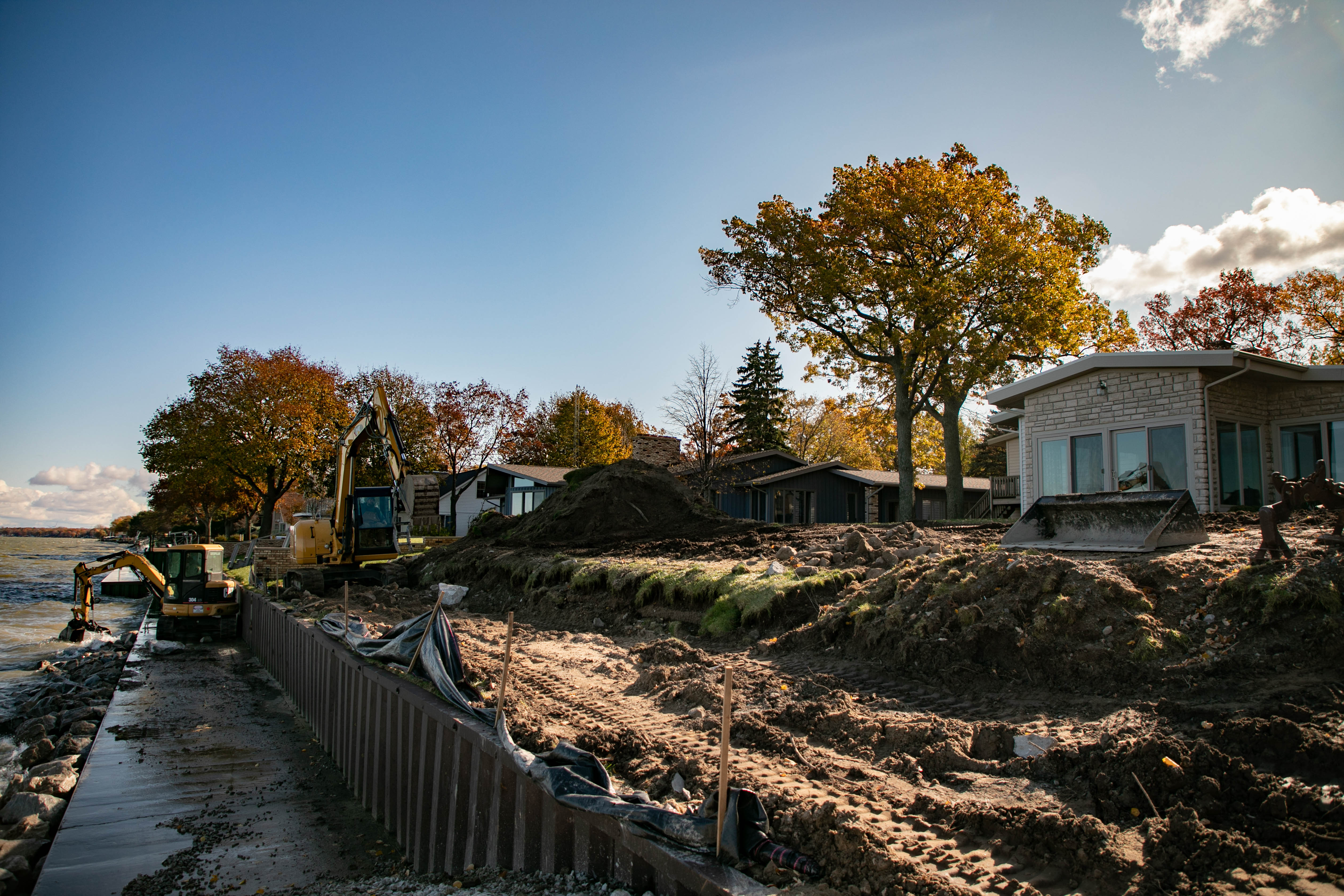 High water levels causing erosion in Sand Point homeowners yards ...