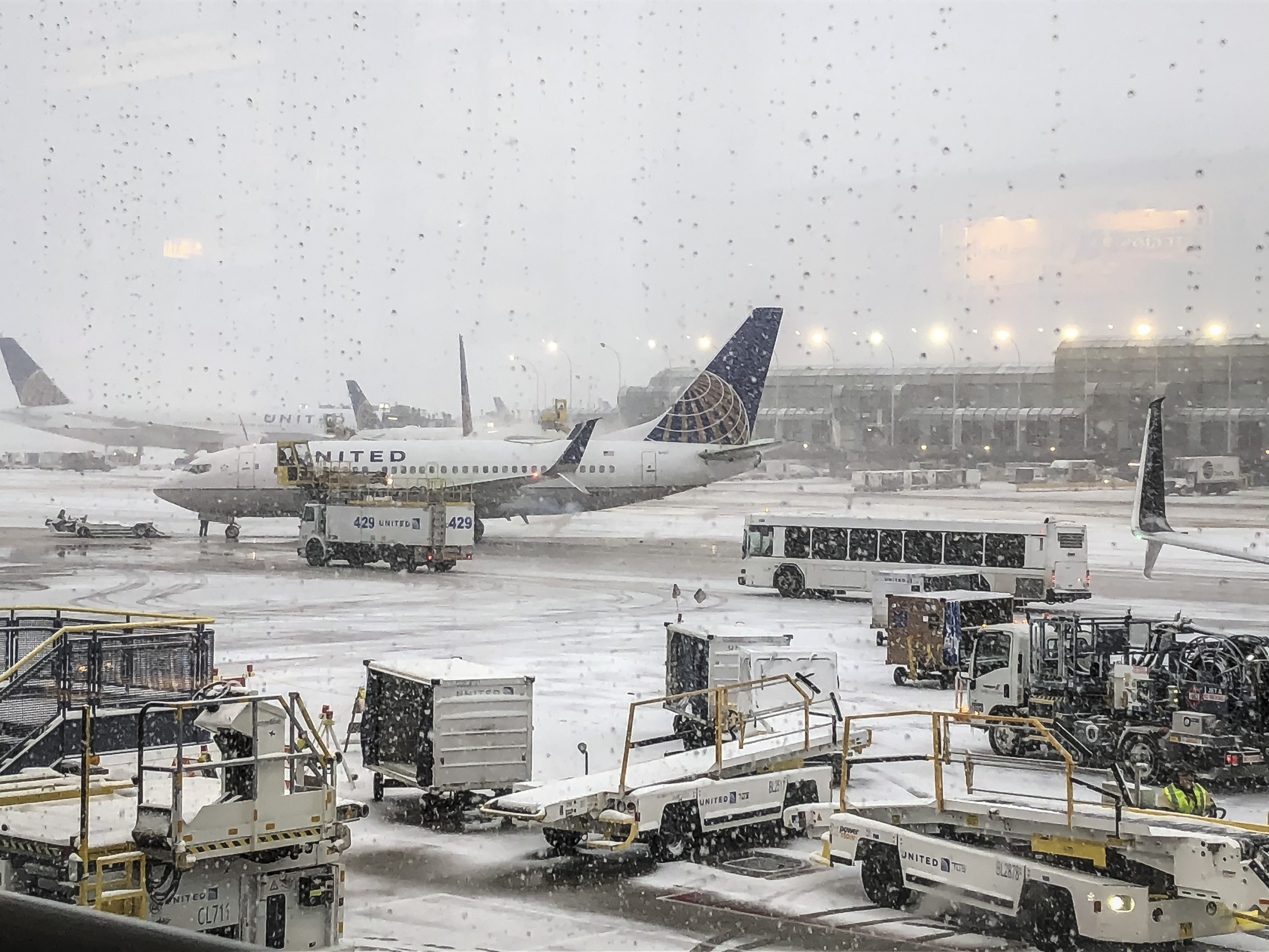 Snow On The Runway With Airplane