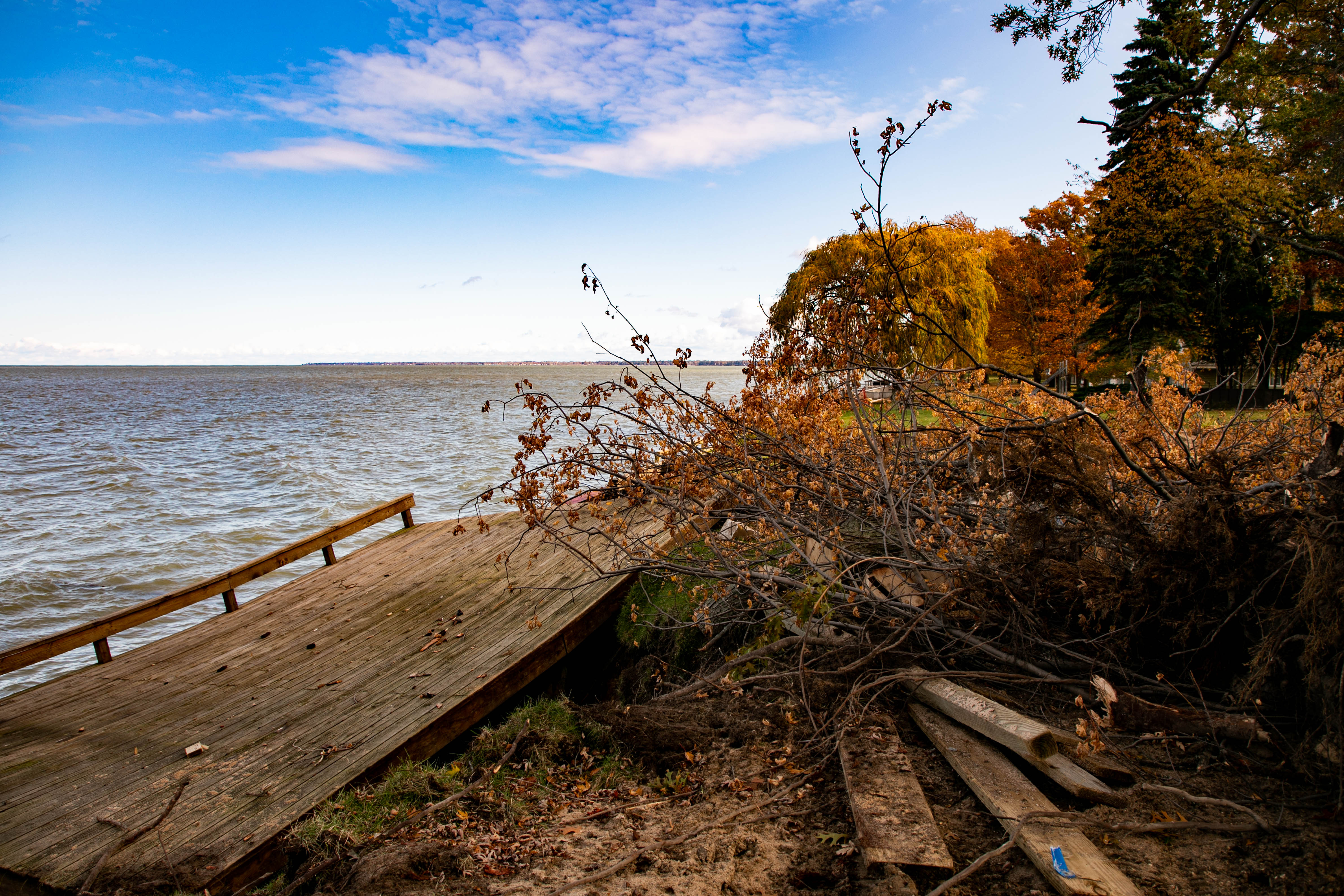 High water levels causing erosion in Sand Point homeowners yards ...