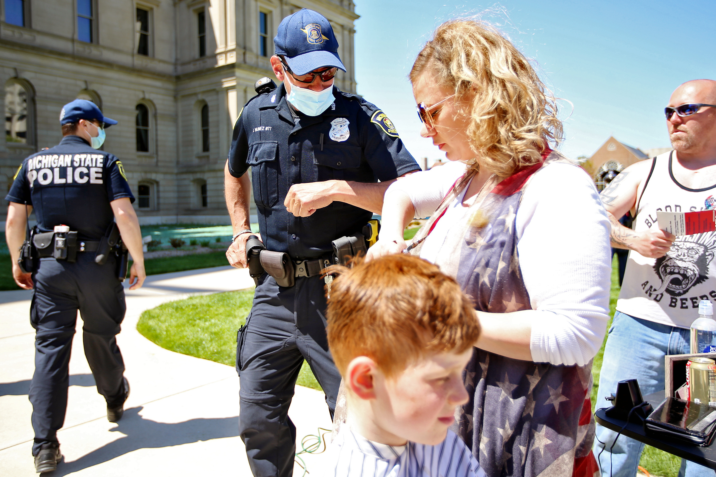 Operation Haircut on Capitol lawn in Lansing - May 20, 2020 - mlive.com