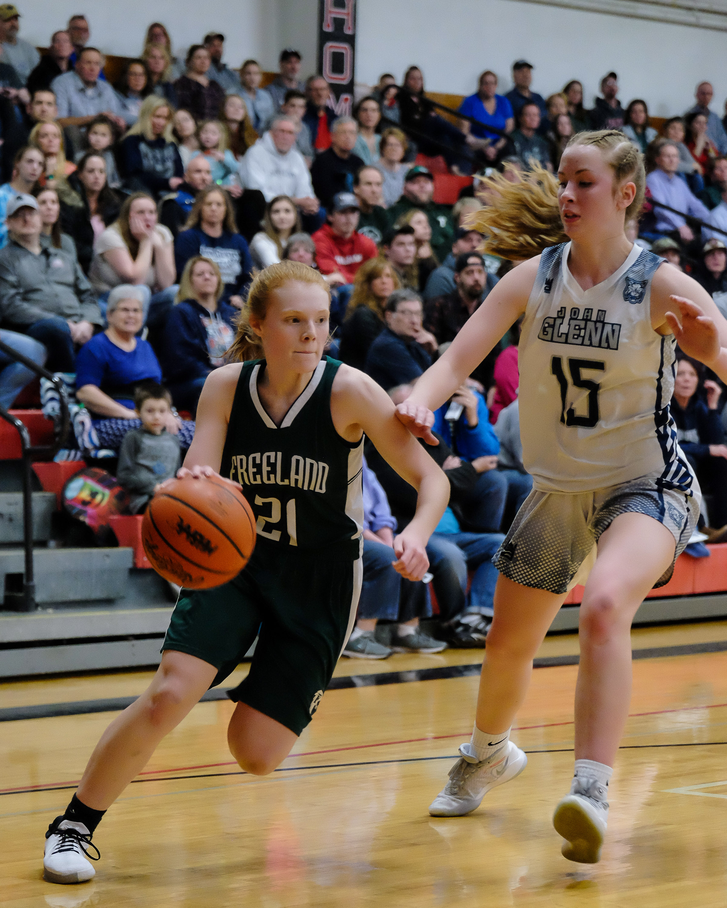 Freeland girls basketball defeats John Glenn 64-38 to win district ...