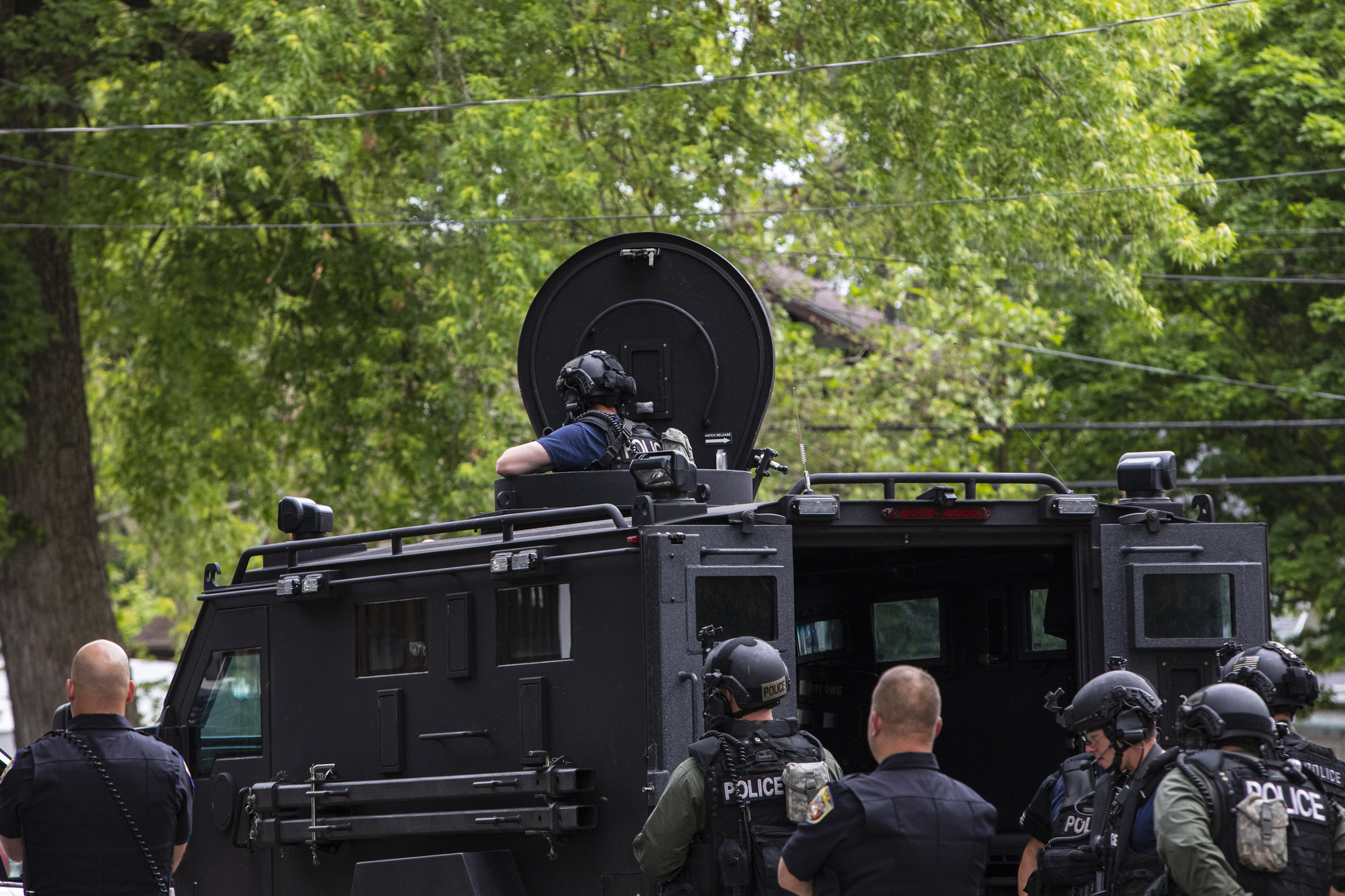 Police surround home on Kalamazoo's Southeast side - mlive.com