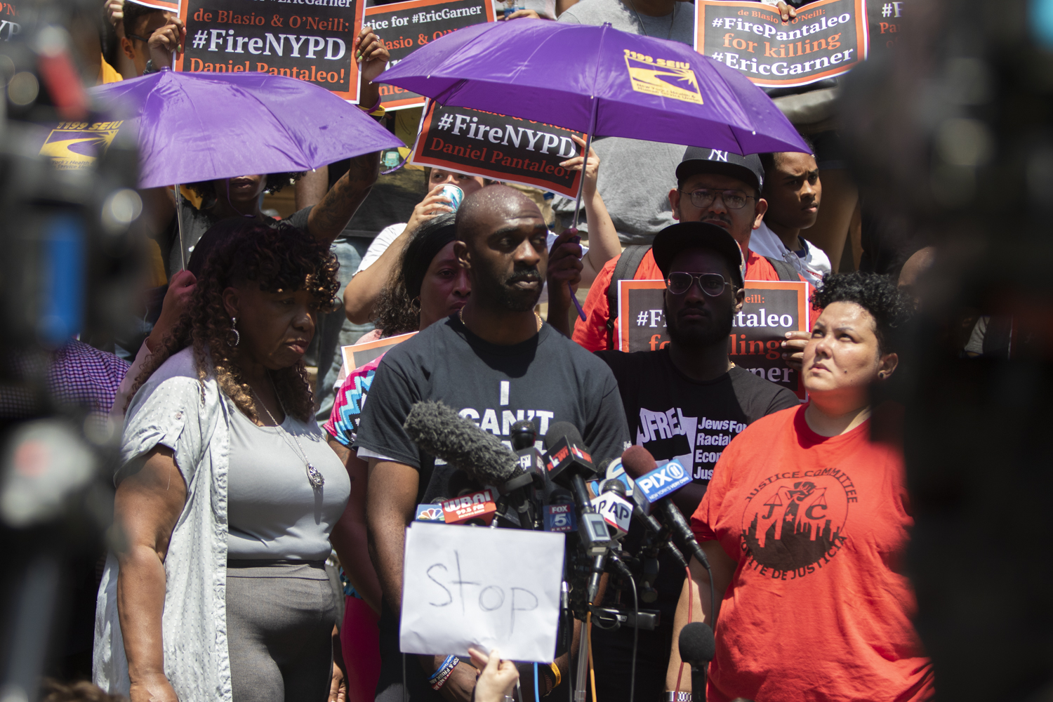 Eric Garner family and supporters speak out after no federal charge for ...