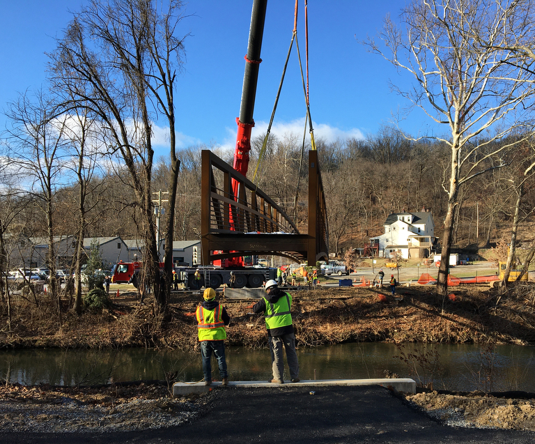 Easton pedestrian bridge connects trail to mixed-use redevelopment ...