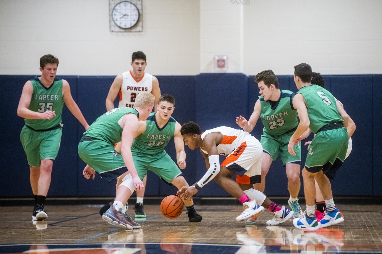 Flint Powers Catholic boys basketball defeats Lapeer 74-55 - mlive.com