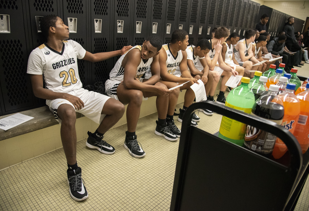 Ypsilanti basketball coaches surprise players with Christmas gifts ...