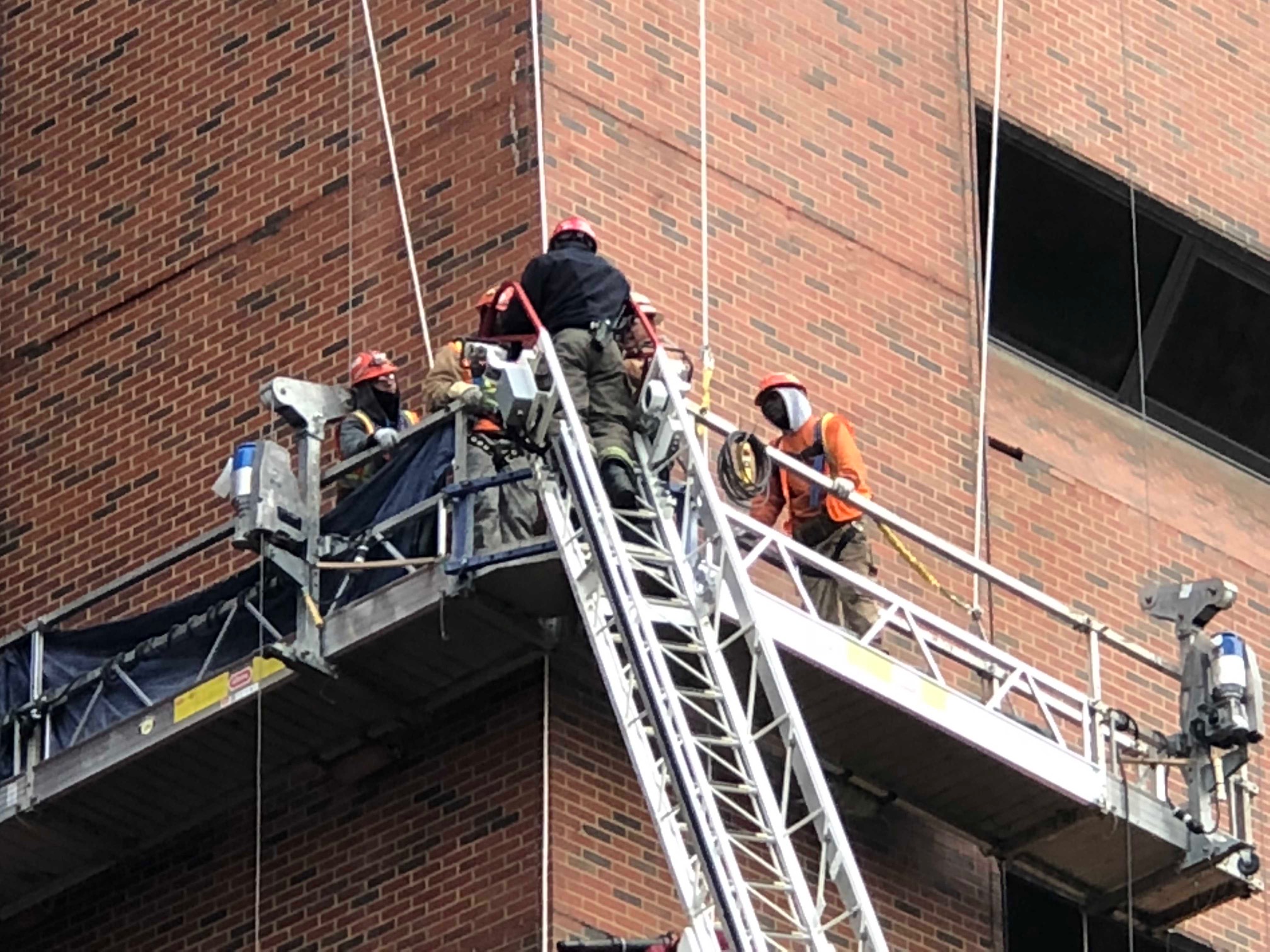 Workers trapped on University Blvd scaffolding - al.com