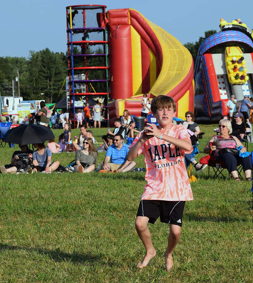 Having fun on the ground at the QuickChek New Jersey Festival of ...
