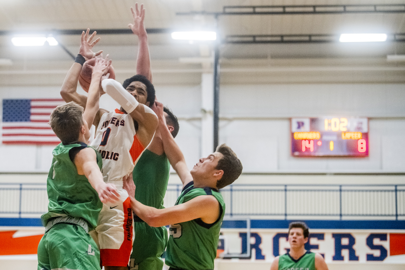 Flint Powers Catholic boys basketball defeats Lapeer 74-55 - mlive.com